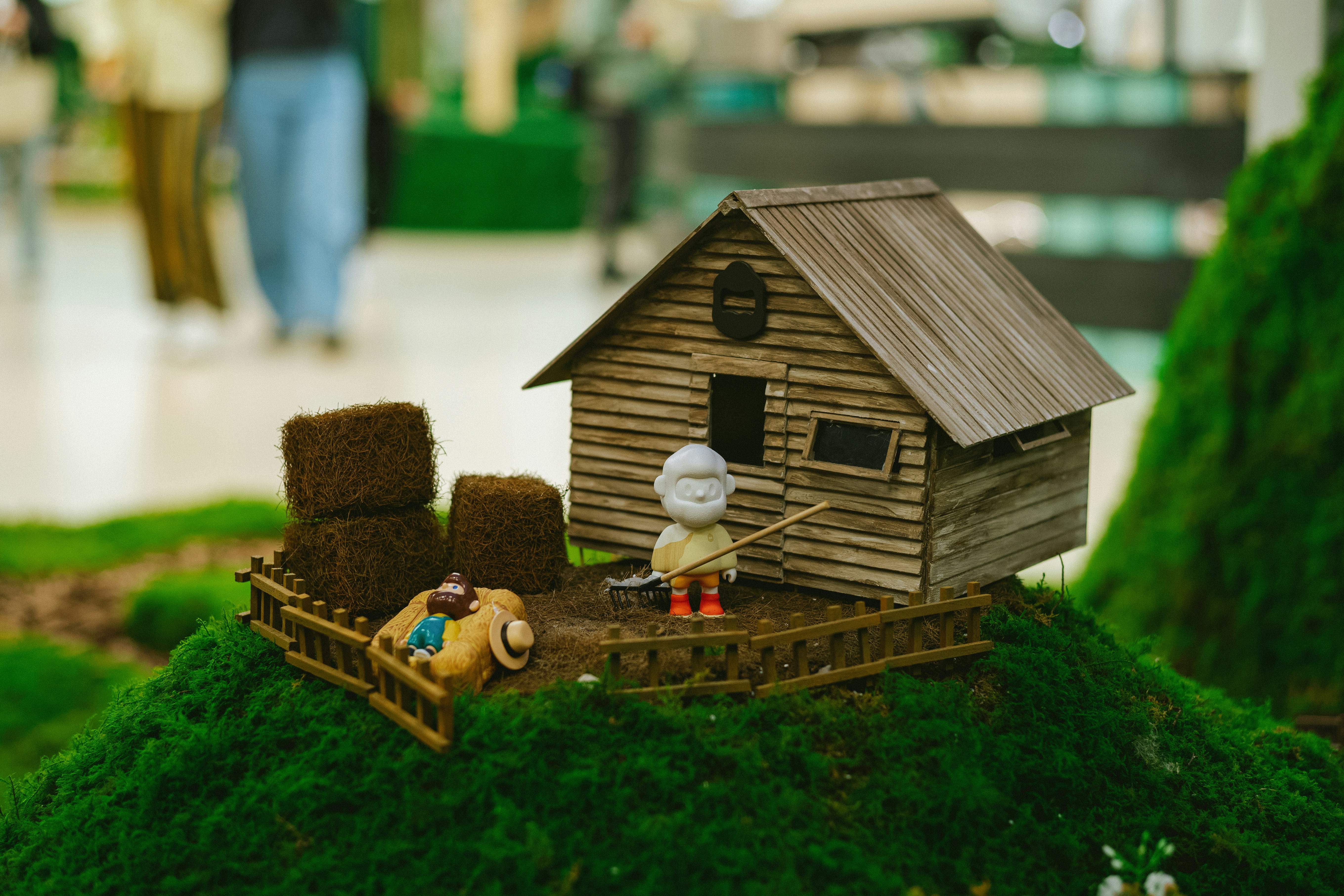 Miniature Farmyard Sojourn on a Lush Green Mound