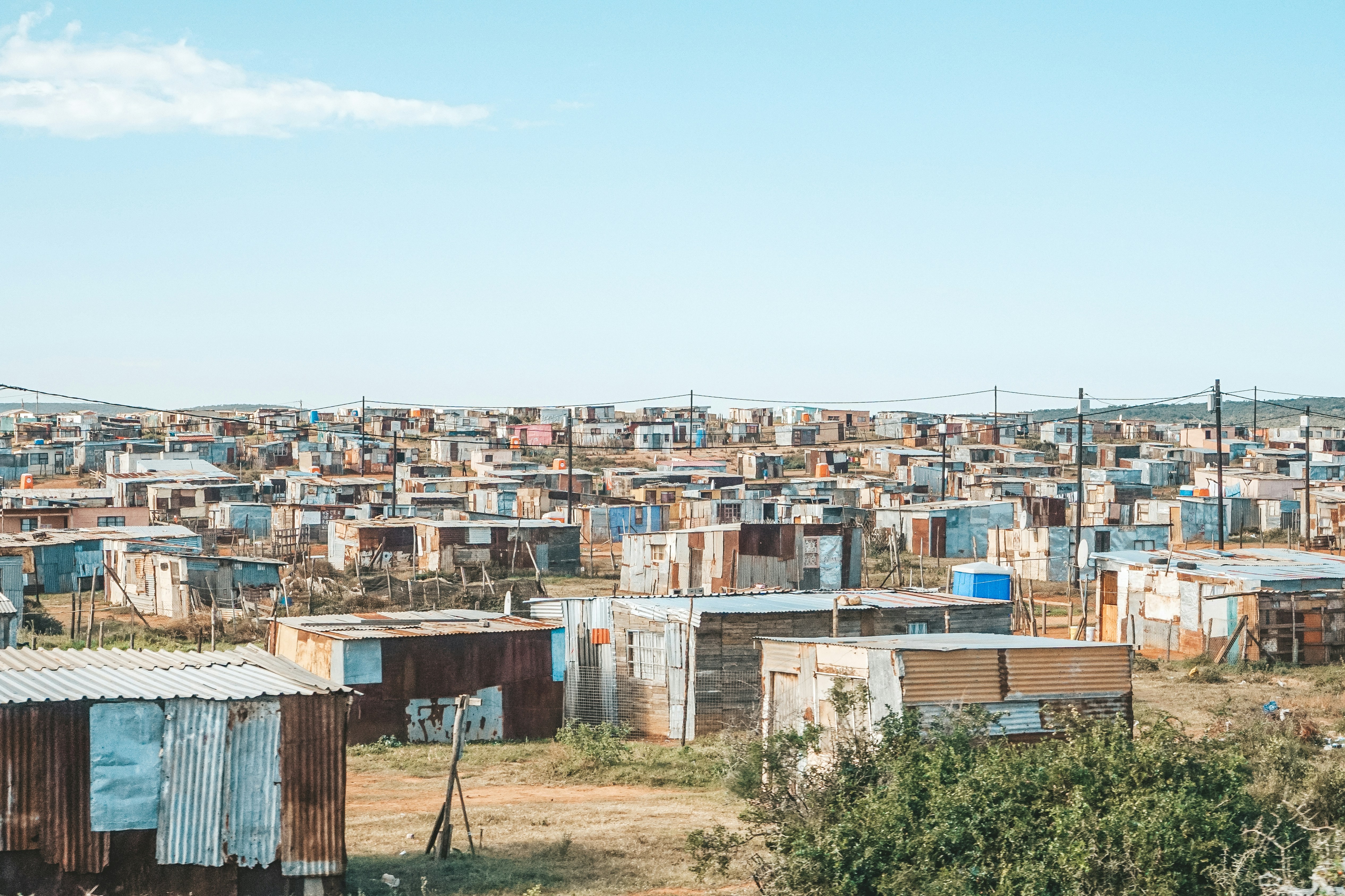 A bunch of shacks that are in the grass photo – Free Cape town Image on ...