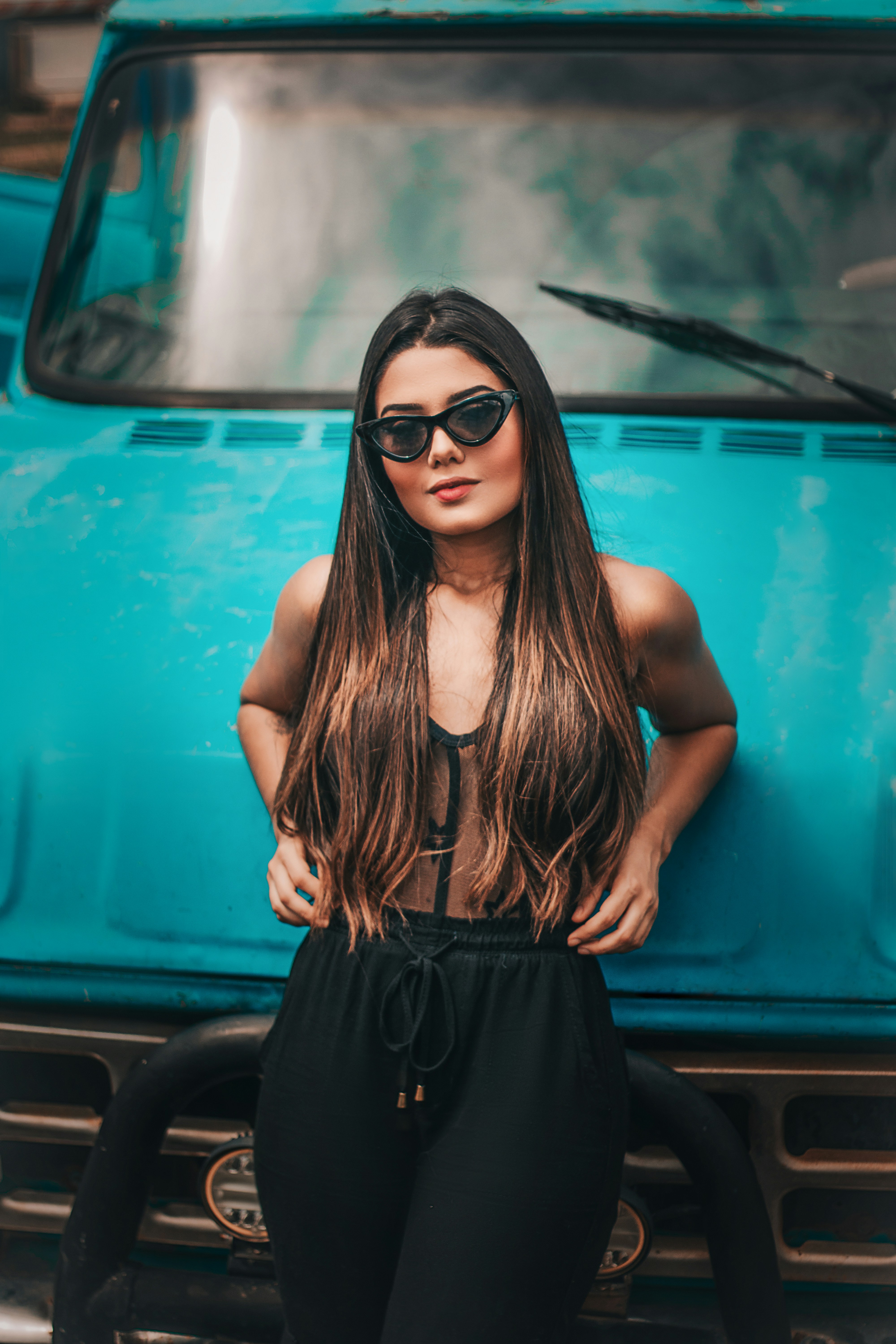 Turquoise Gaze: Portrait in front of a Retro Blue Van