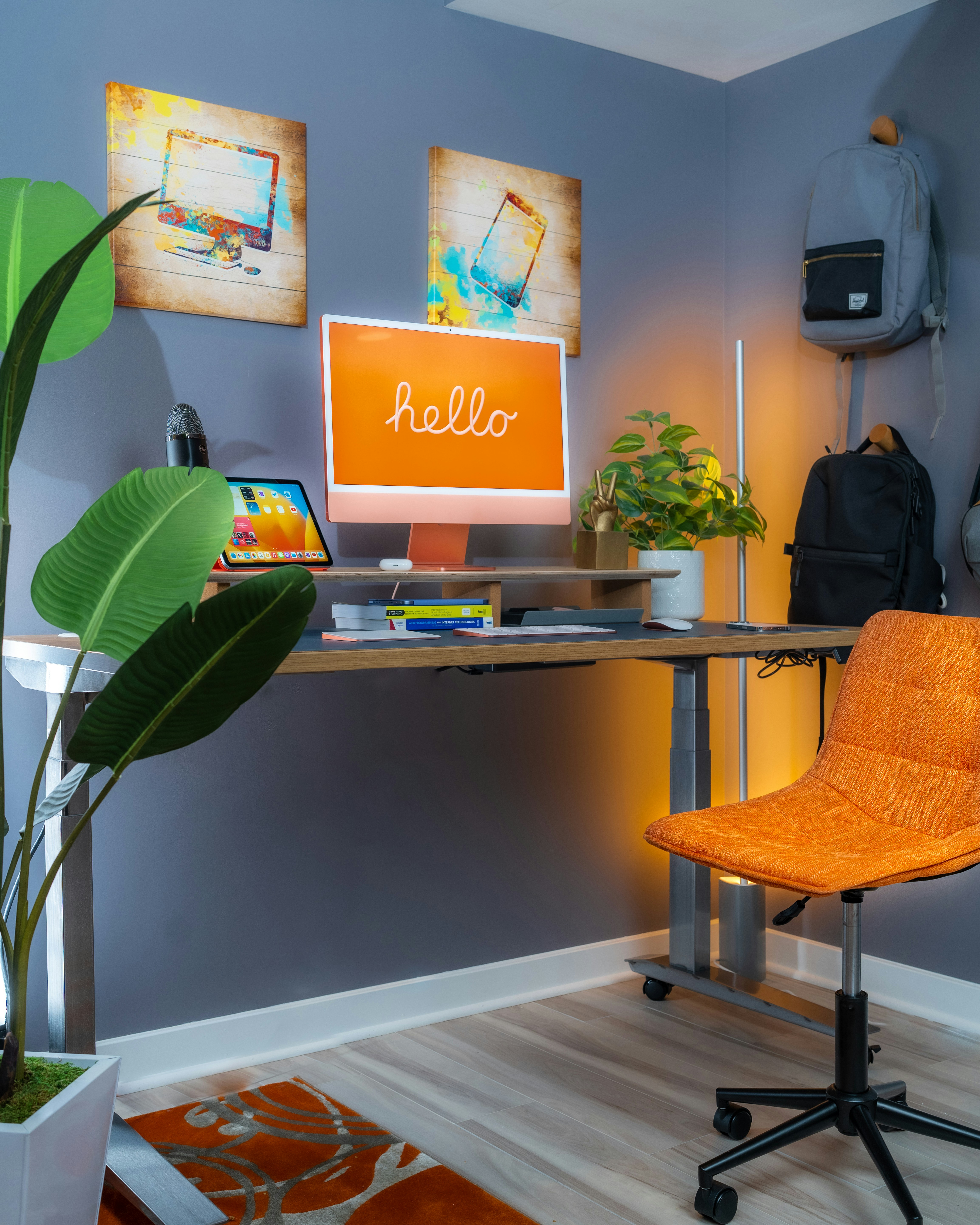 A desk with a computer and a chair in a room photo – Free Standing desk ...