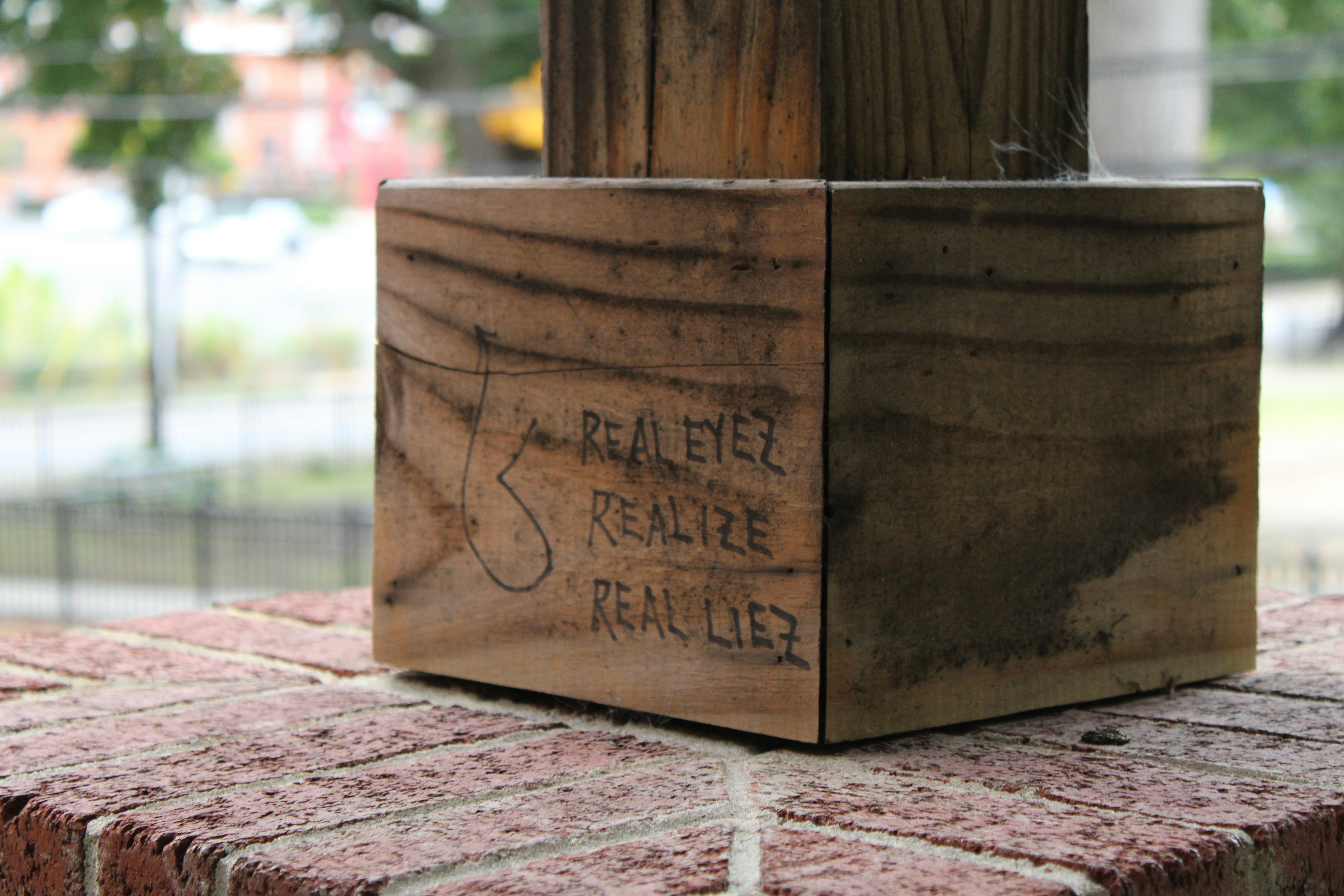 Whispers of Wisdom on Weathered Wood