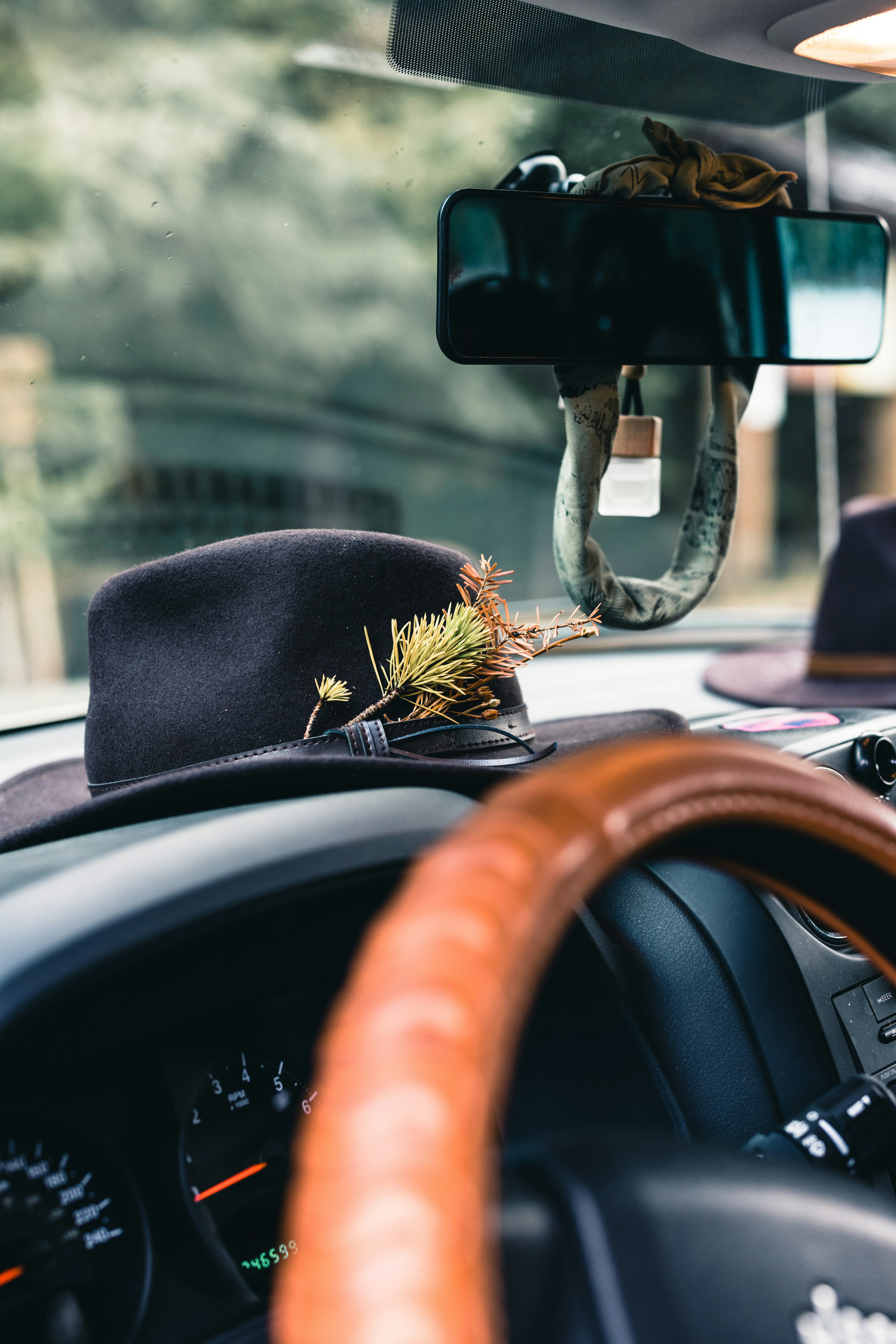 A car dashboard with a hat on top of it photo – Free Kootenay national ...