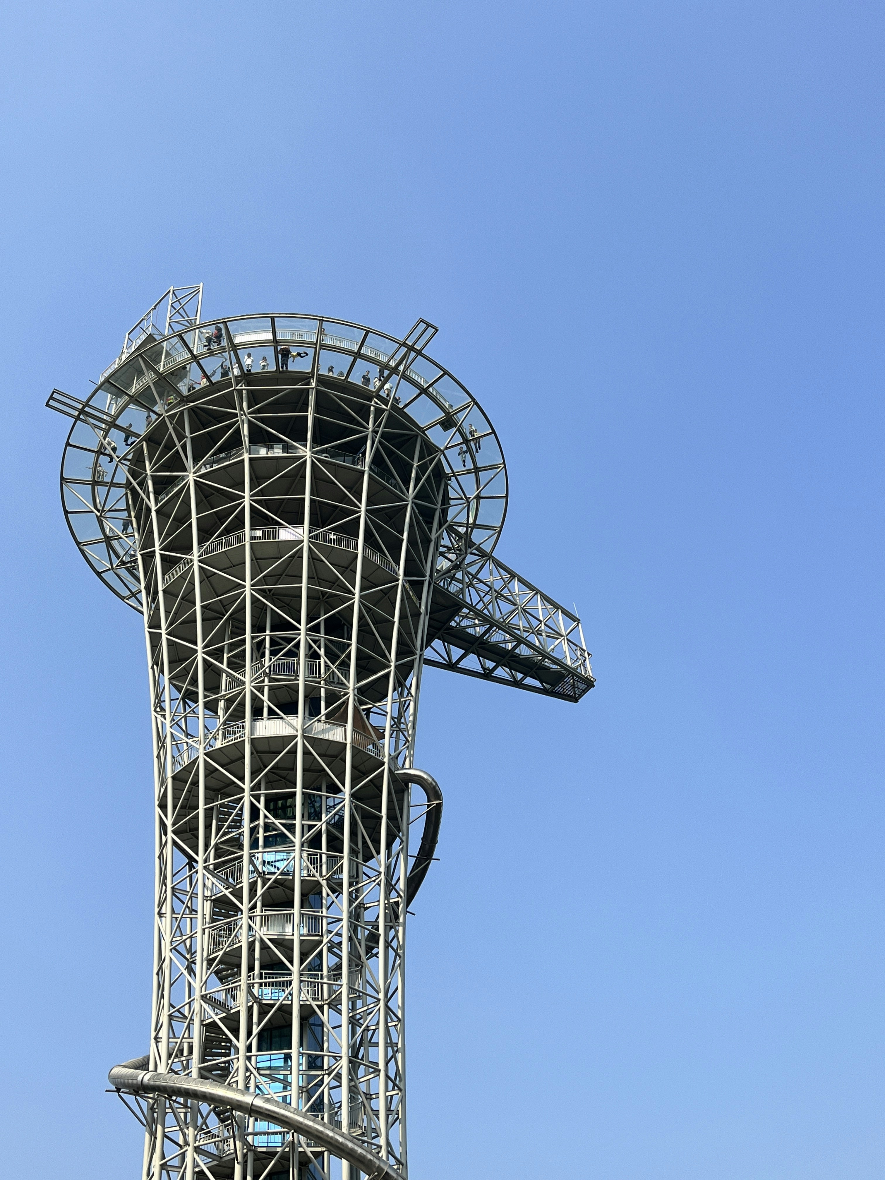 A very tall metal structure with a sky background photo – Free Tower ...