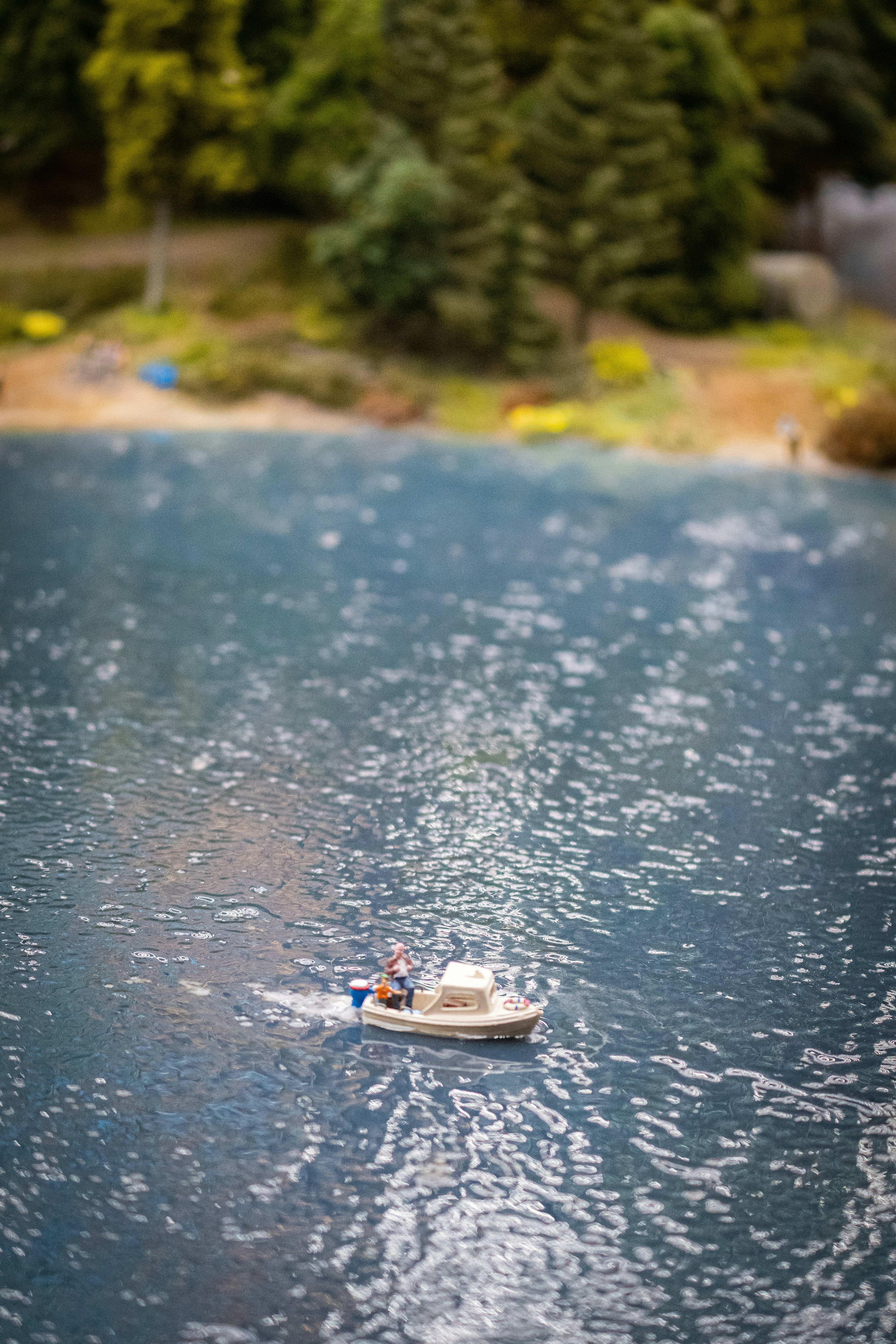 A small boat floating on top of a lake photo – Free Saint petersburg ...