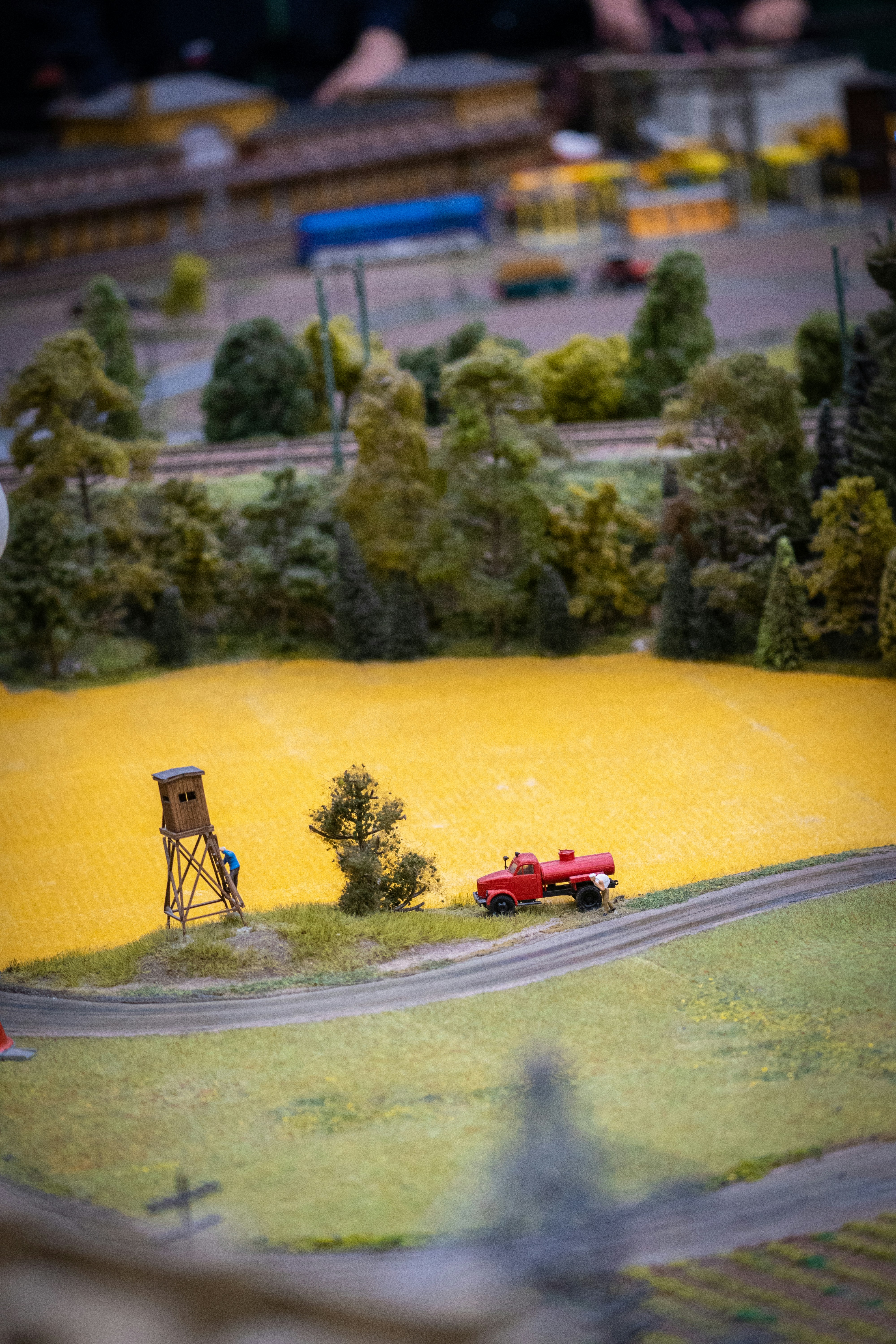 A model train set with cars and a tower photo – Free Museum Image on ...