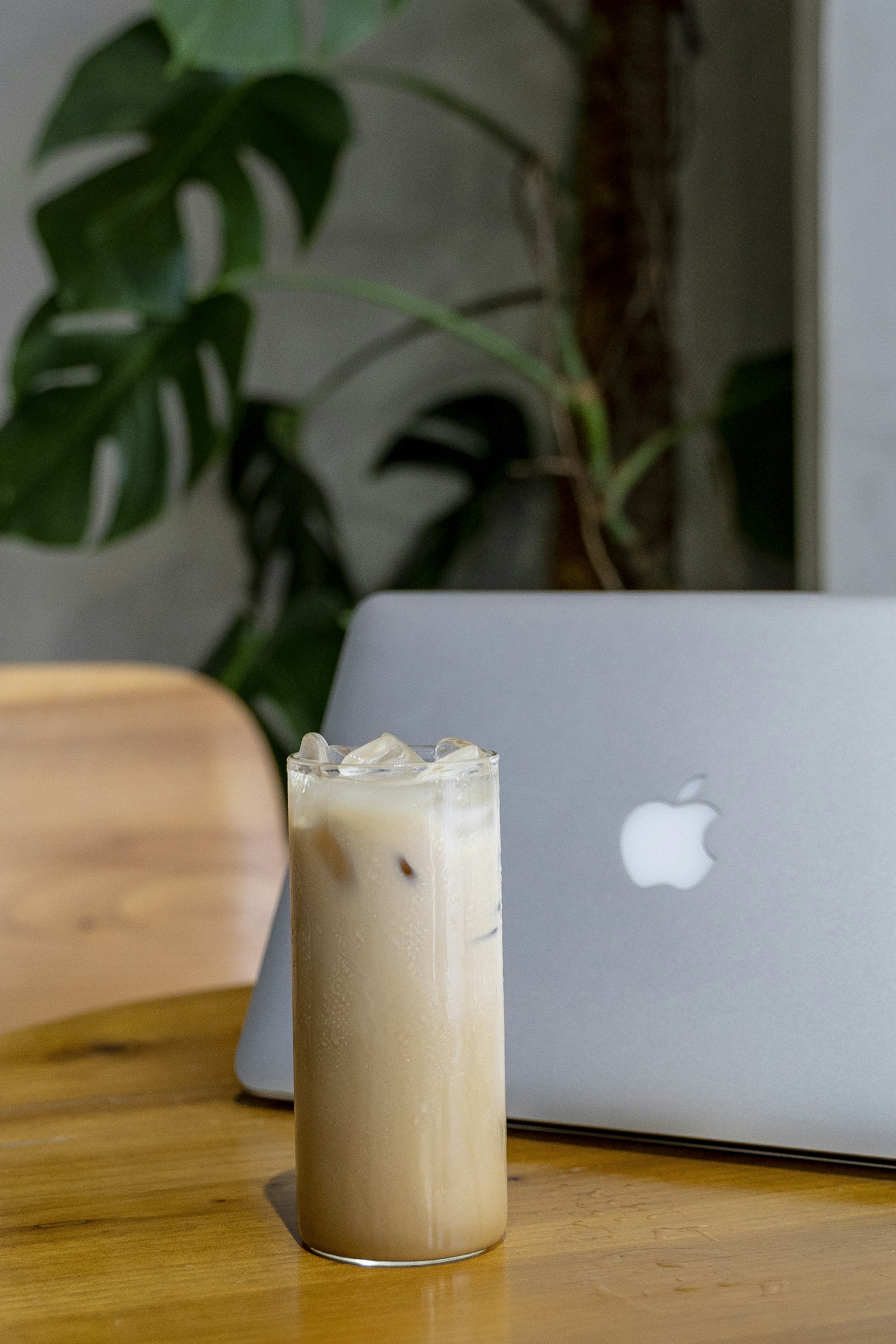 A glass of iced coffee next to a laptop photo – Free Coffee Image on ...