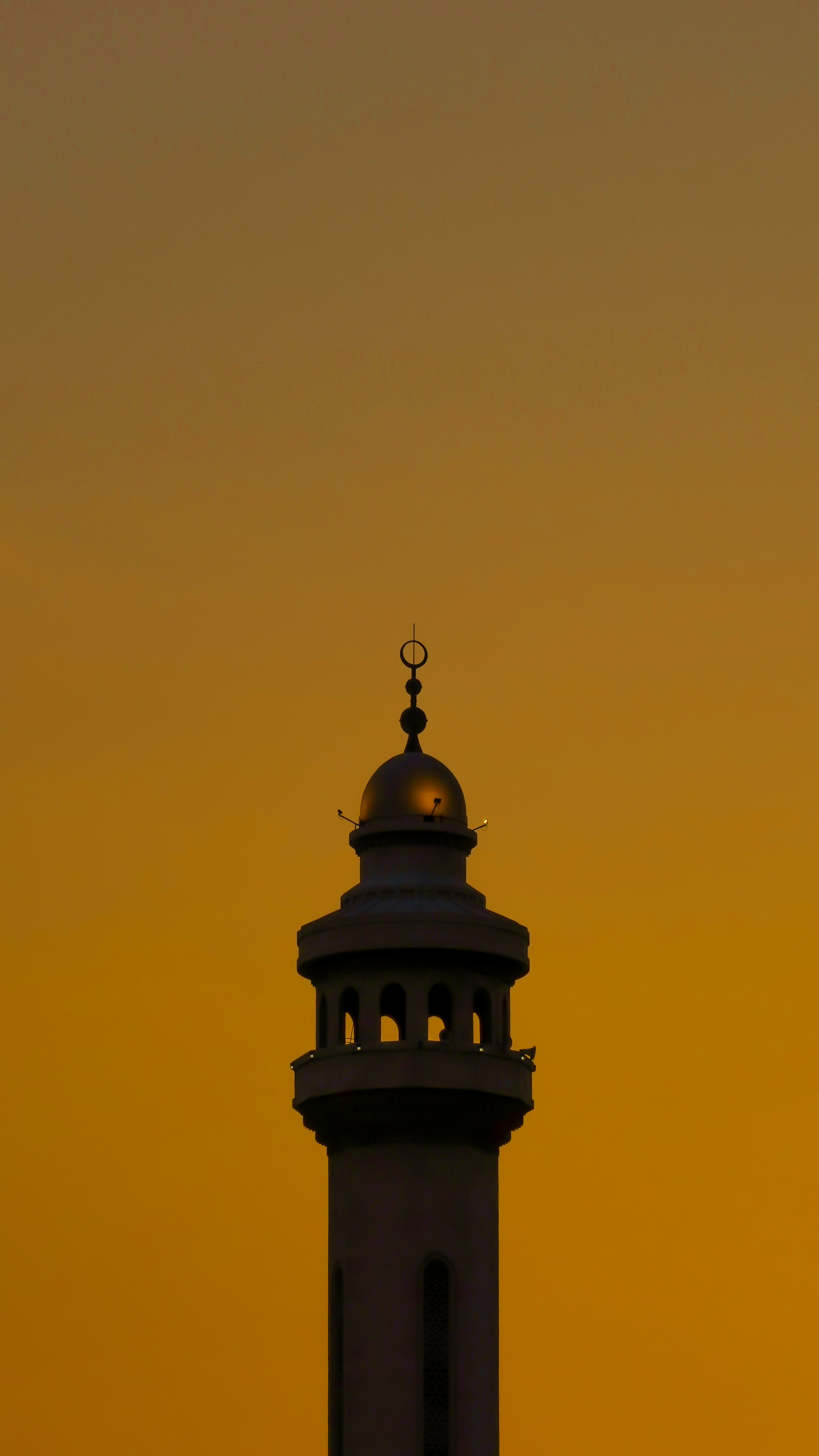 A tall tower with a clock on top of it photo – Free Bahrain Image on ...