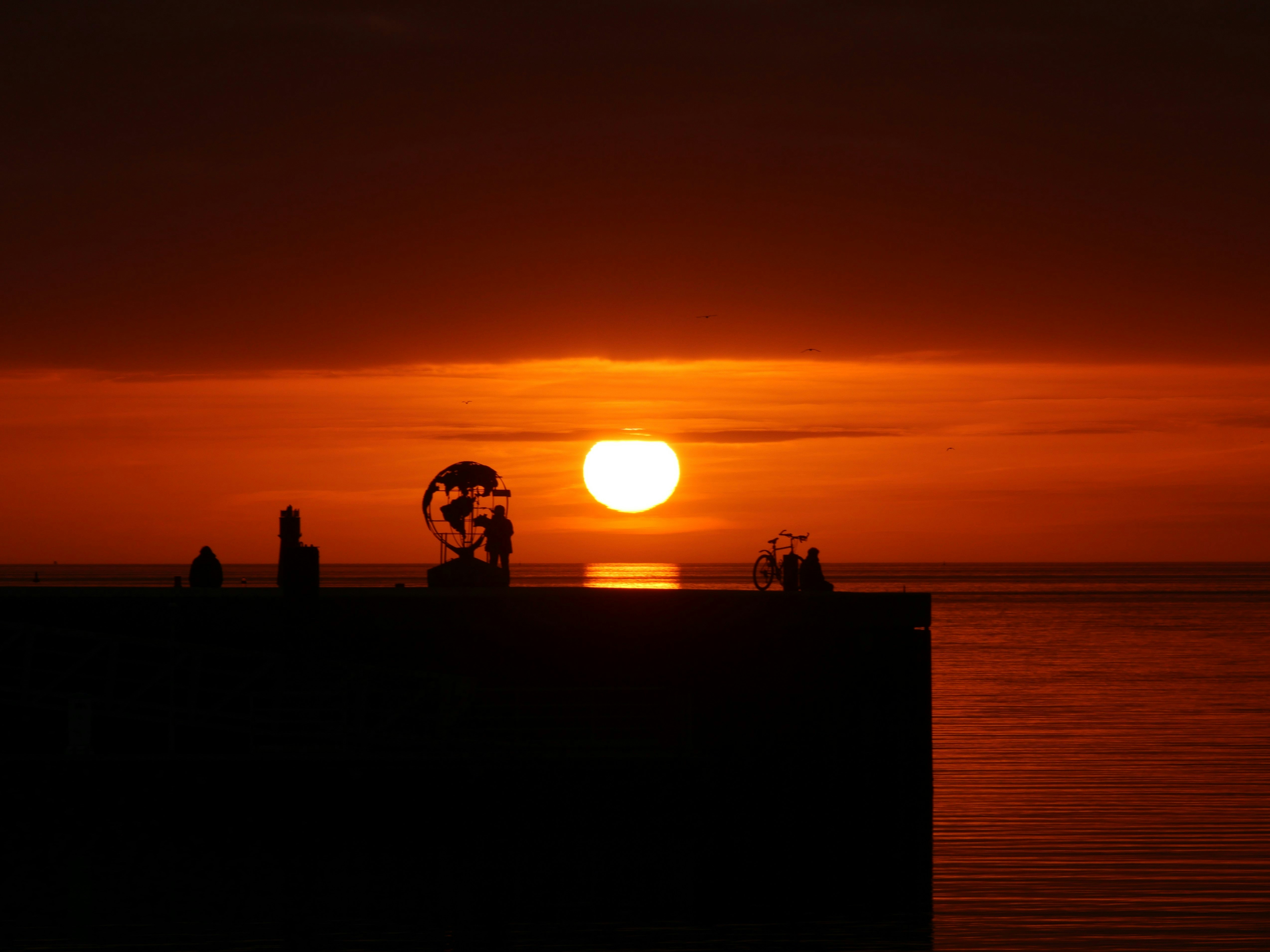 Sunset Silhouettes on the Pier