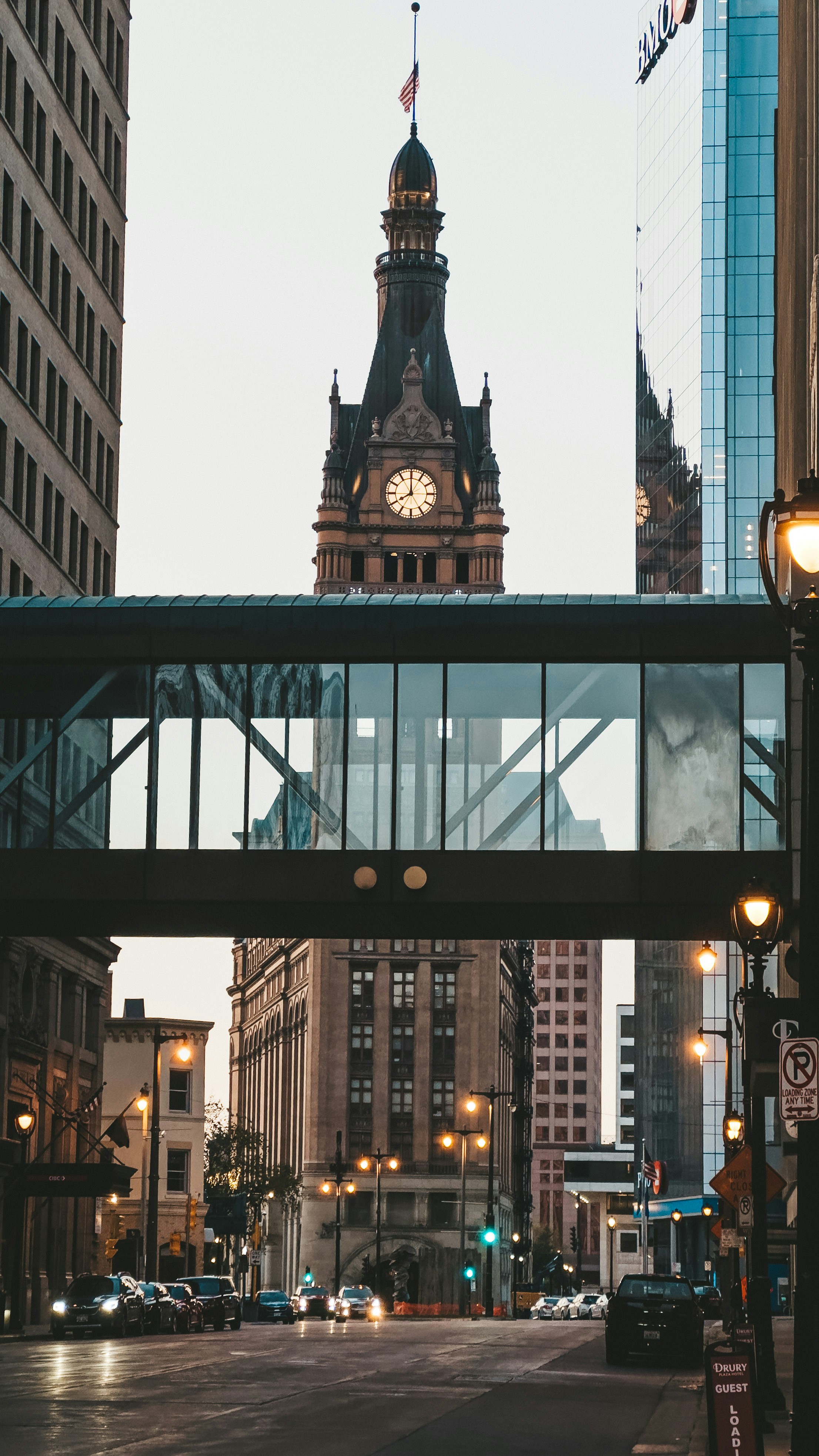 A clock tower towering over a city street photo – Free Milwaukee Image ...