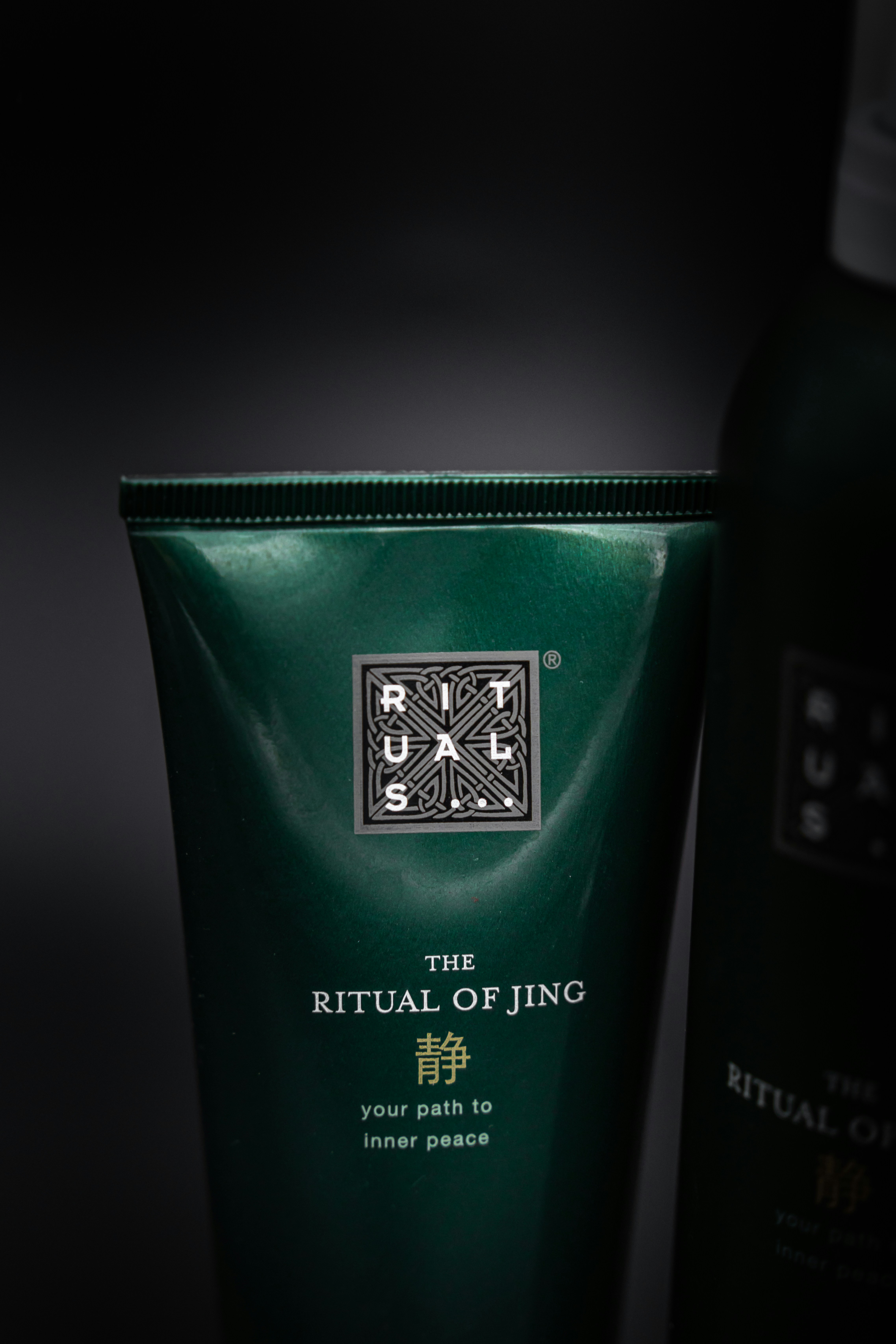 A tube of ritual of ling ling next to a bottle of ritual of ling ling ...