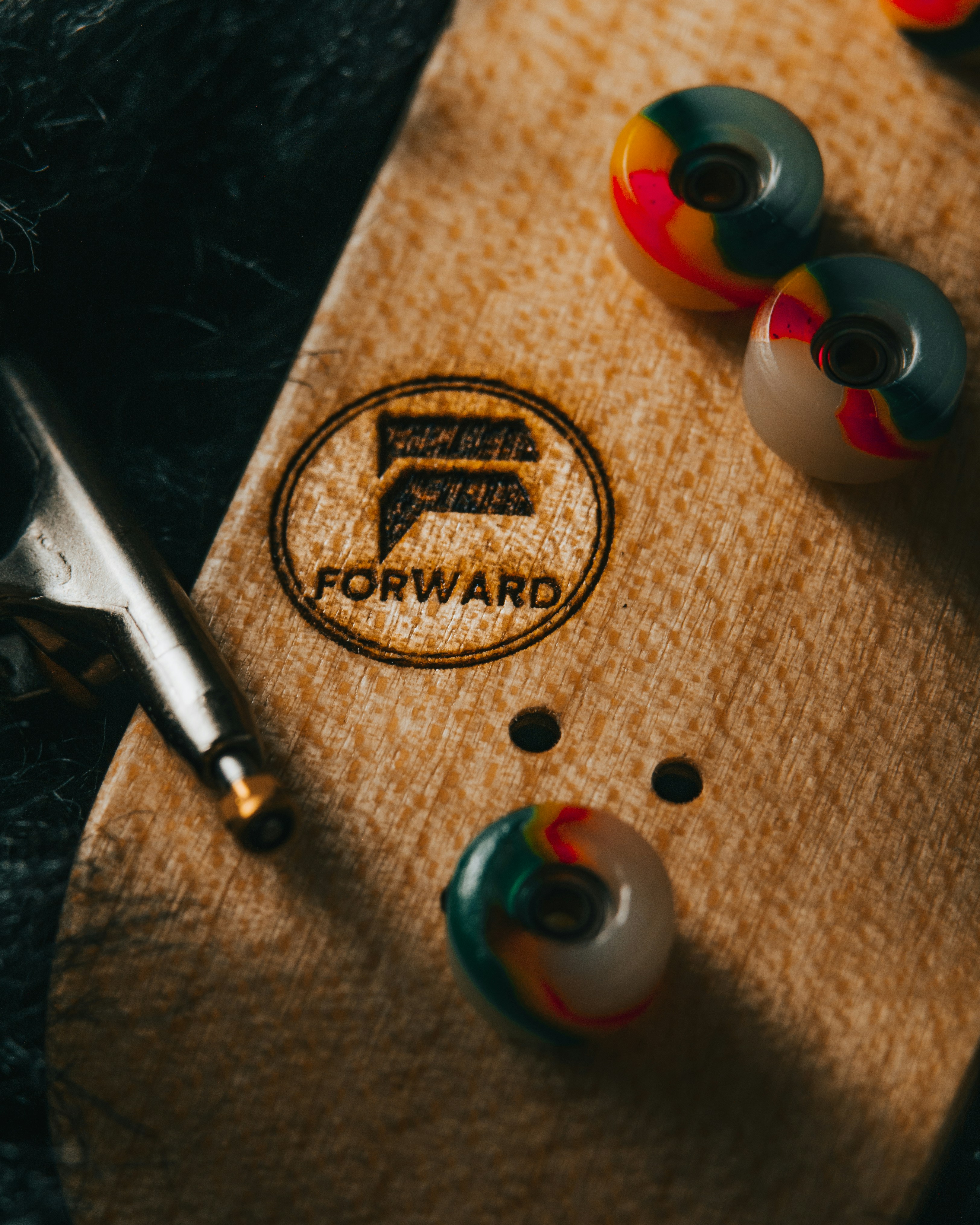 Forward Mark on Timber: A Macro Moment with Swirled Color Orbs