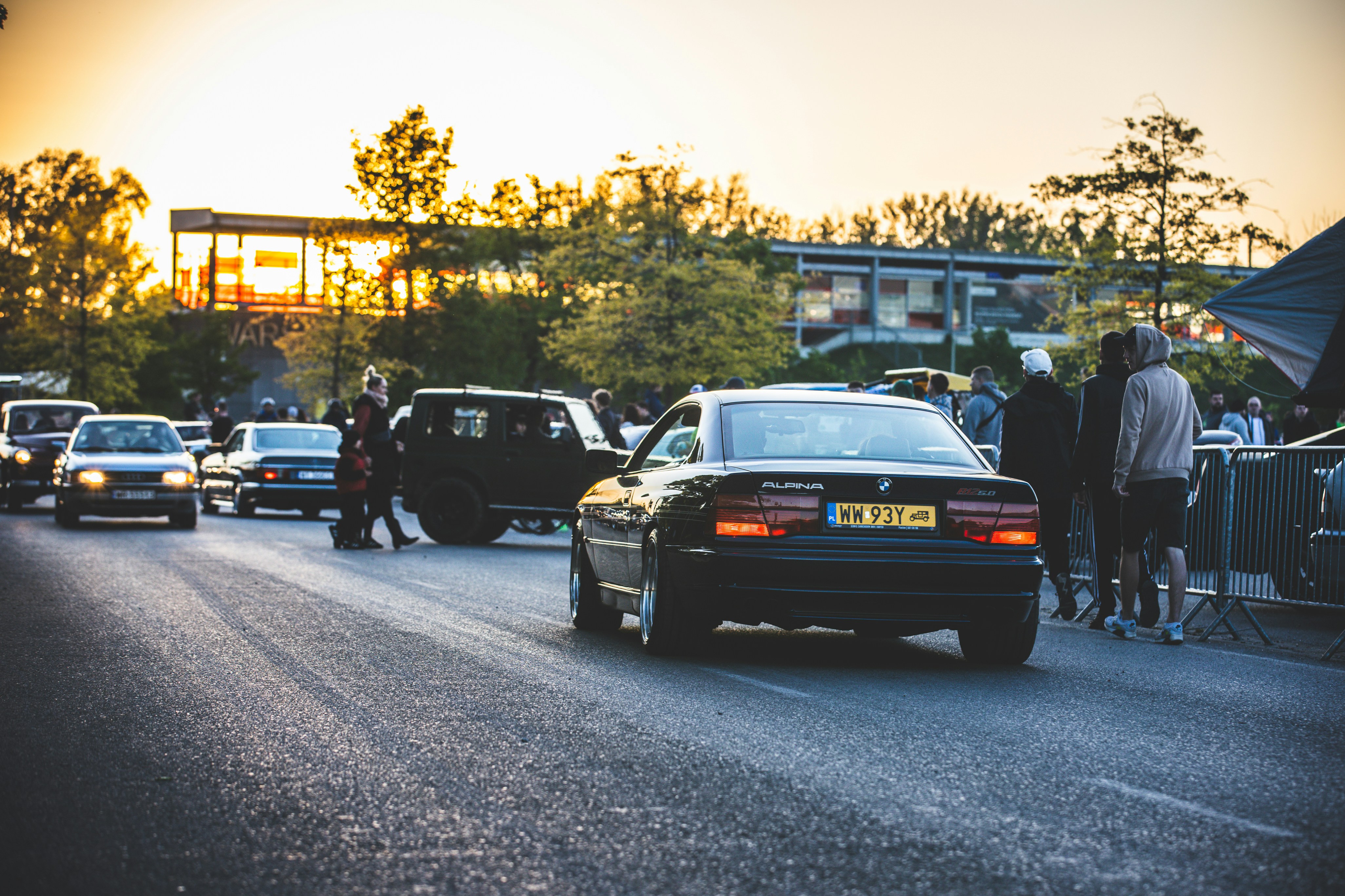 Amber Hour Car Meet: Neon Reflections on a Sunset Street