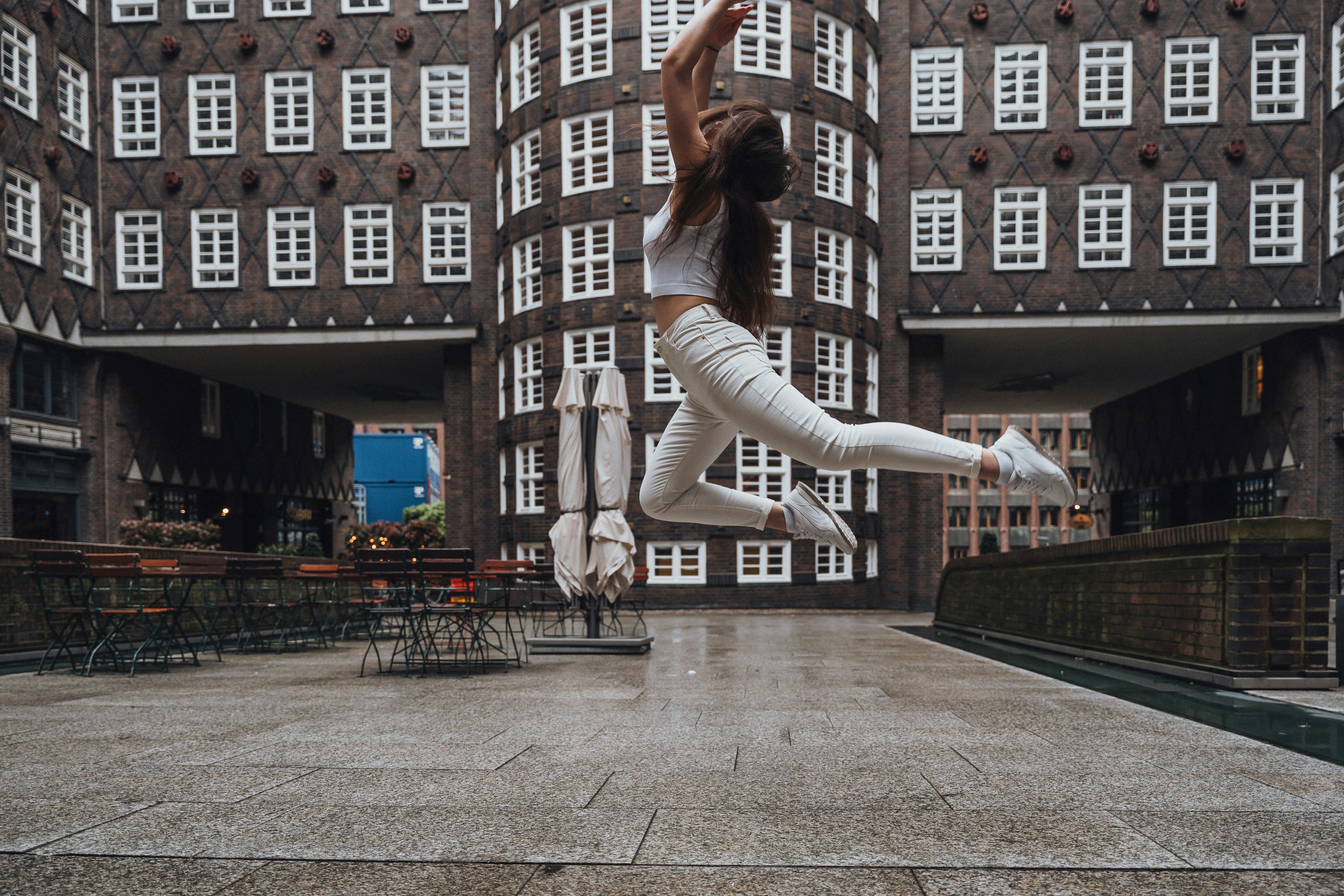 Leap in the Courtyard: A Freestyle Jump Over a Historic Square