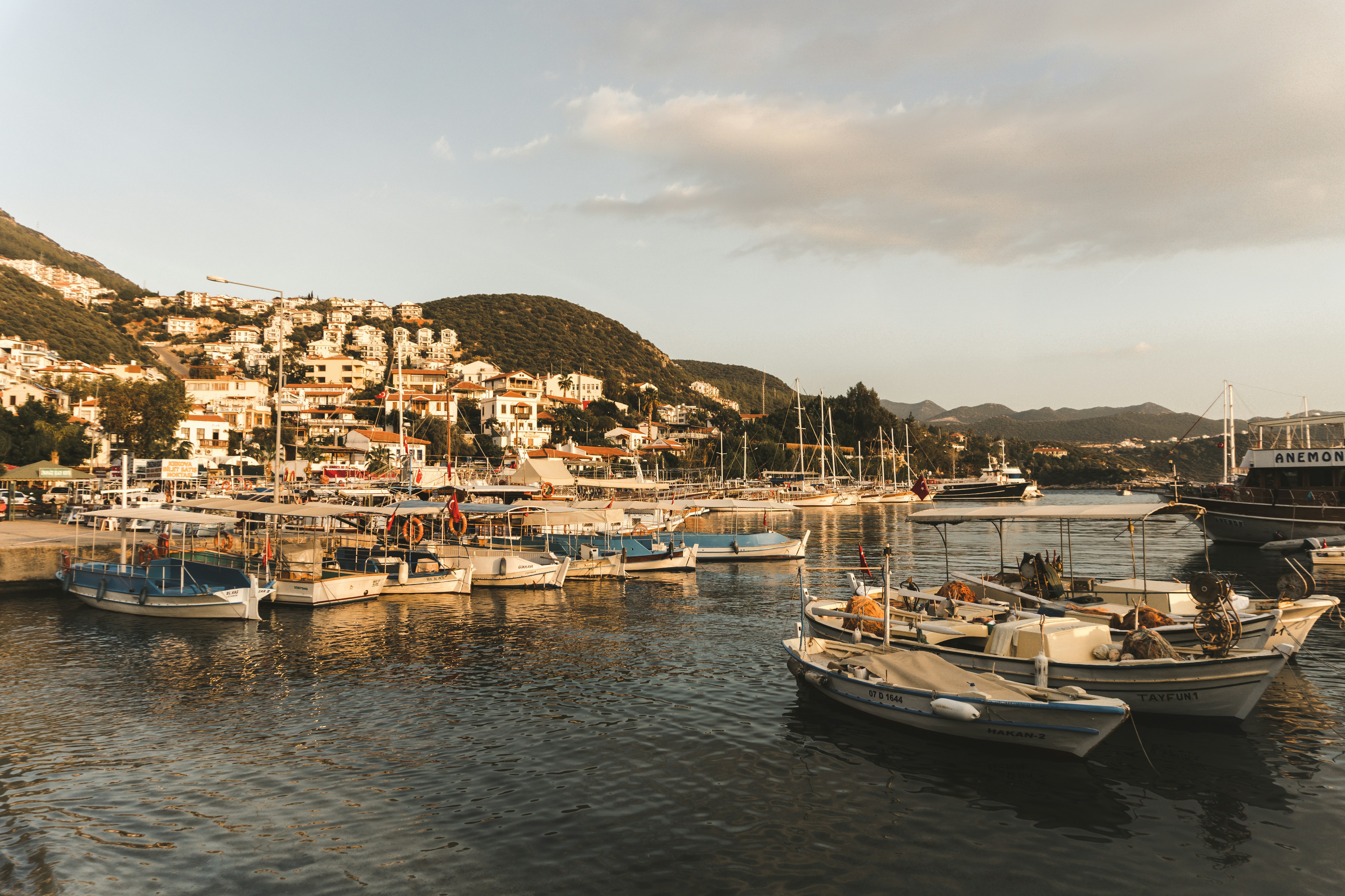 A group of boats floating on top of a body of water photo – Free Turkey ...