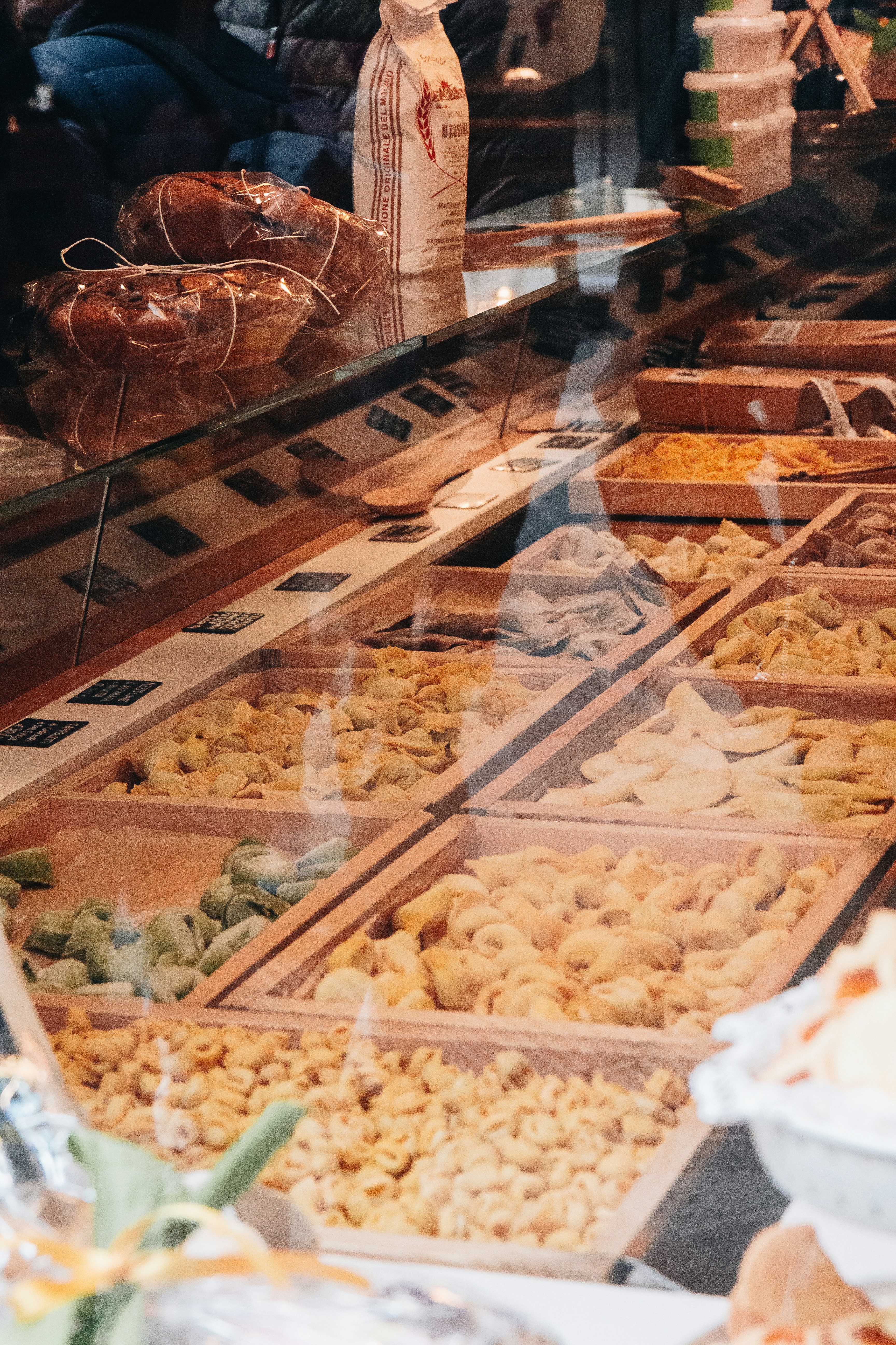 A display case filled with lots of different types of food photo – Free ...