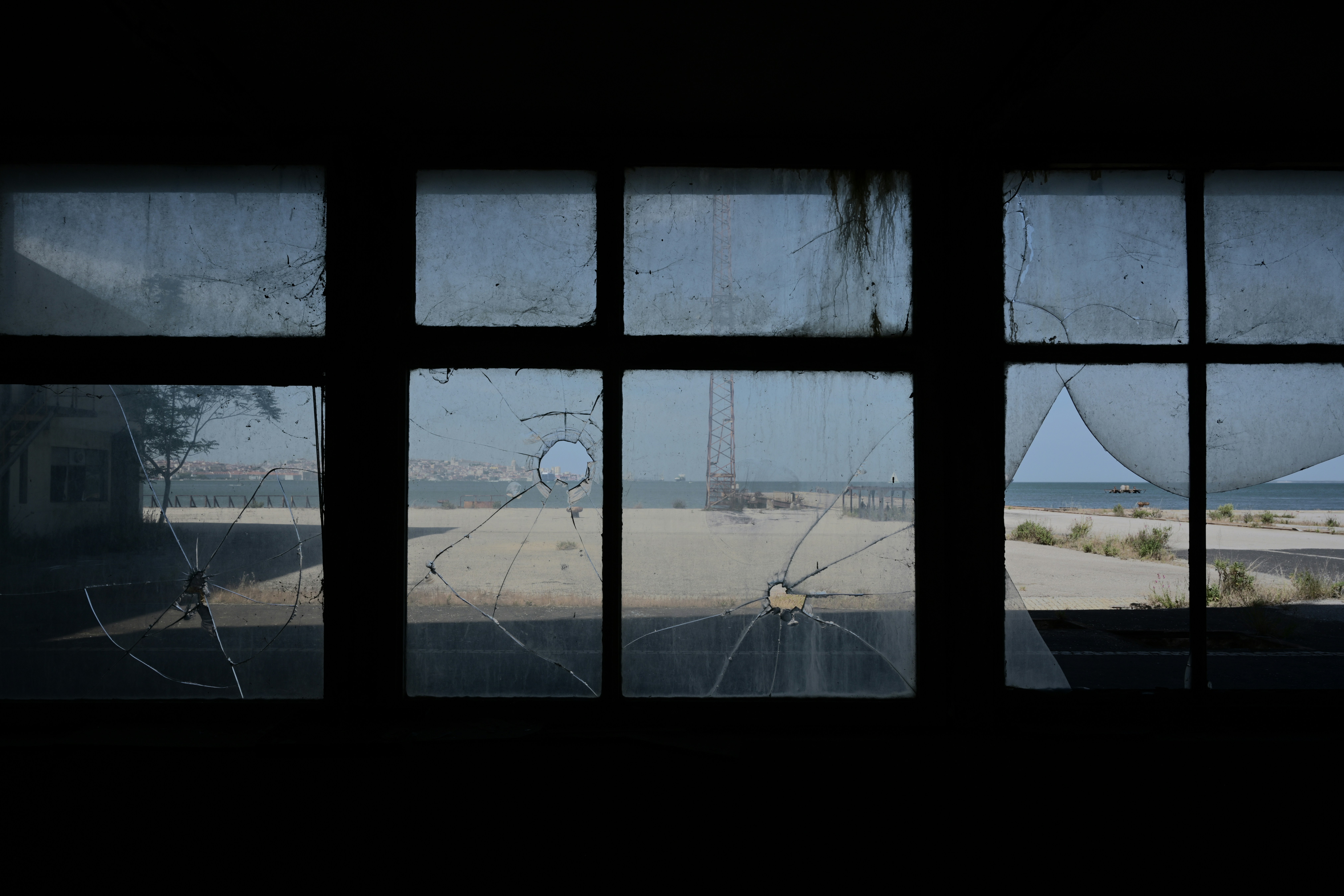 A broken window with a view of a beach photo – Free Portugal Image on ...