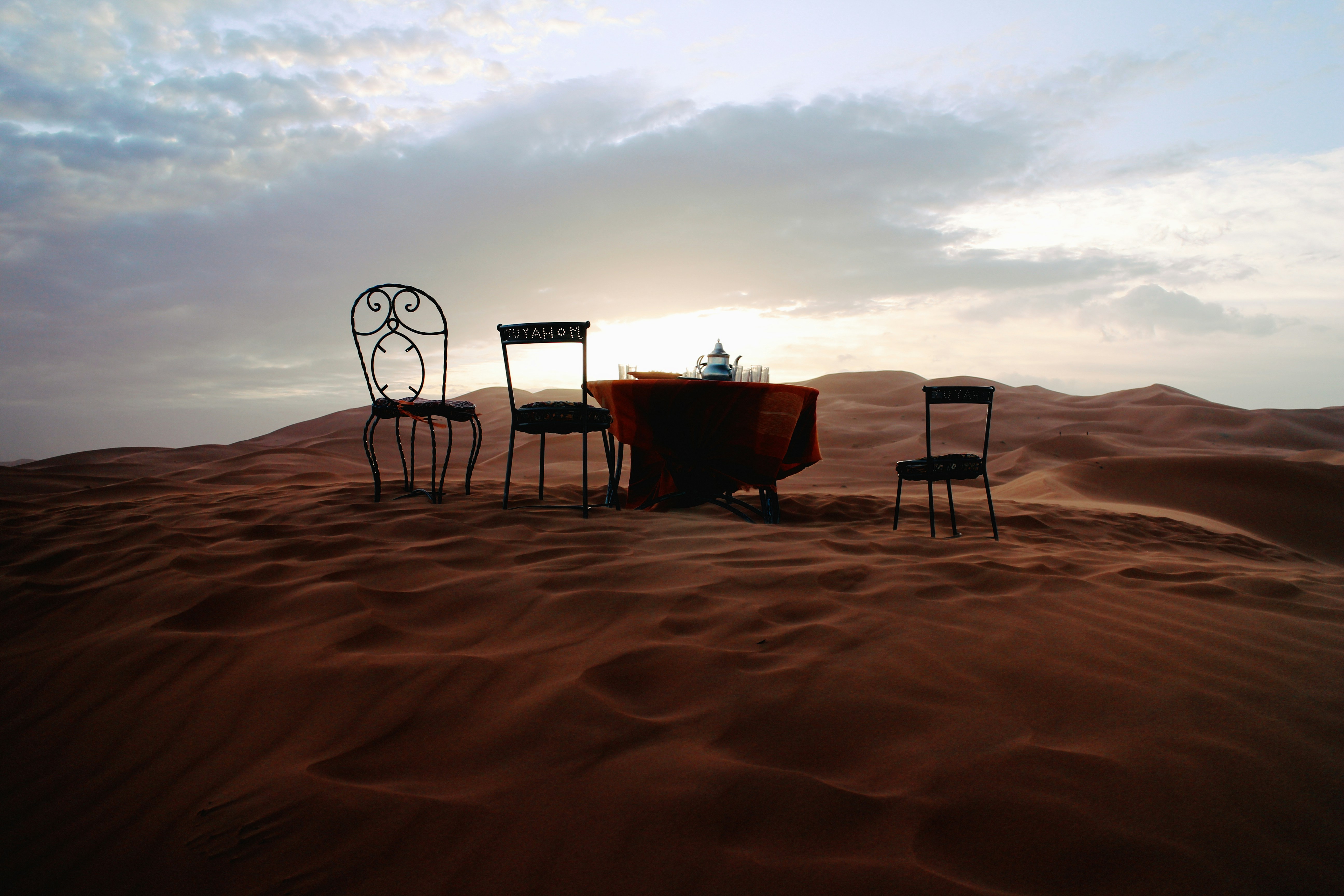 Tea for breakfast during sunrise in the dessert.
