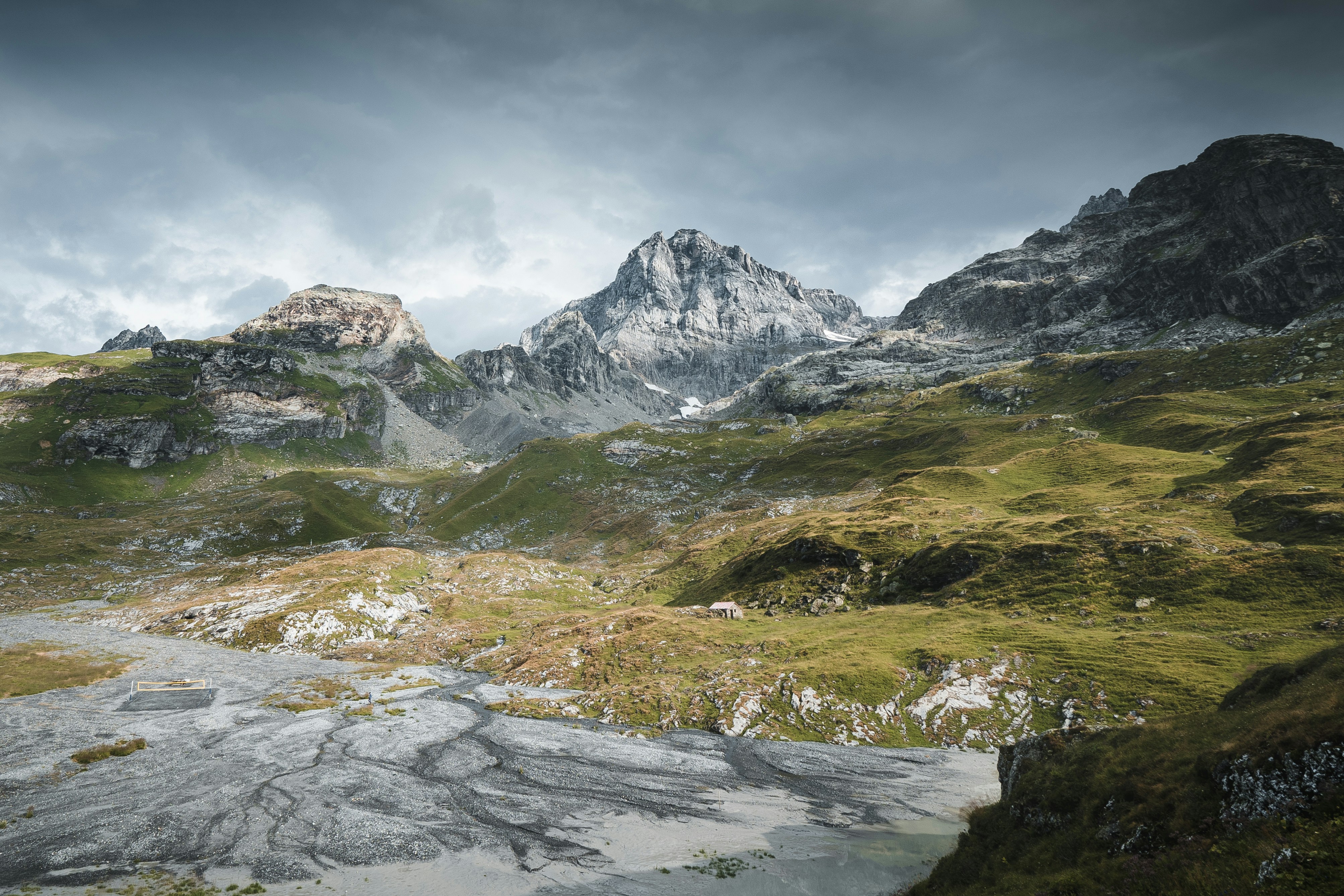 Stone Terrace Overlook Beneath A Jagged Peak