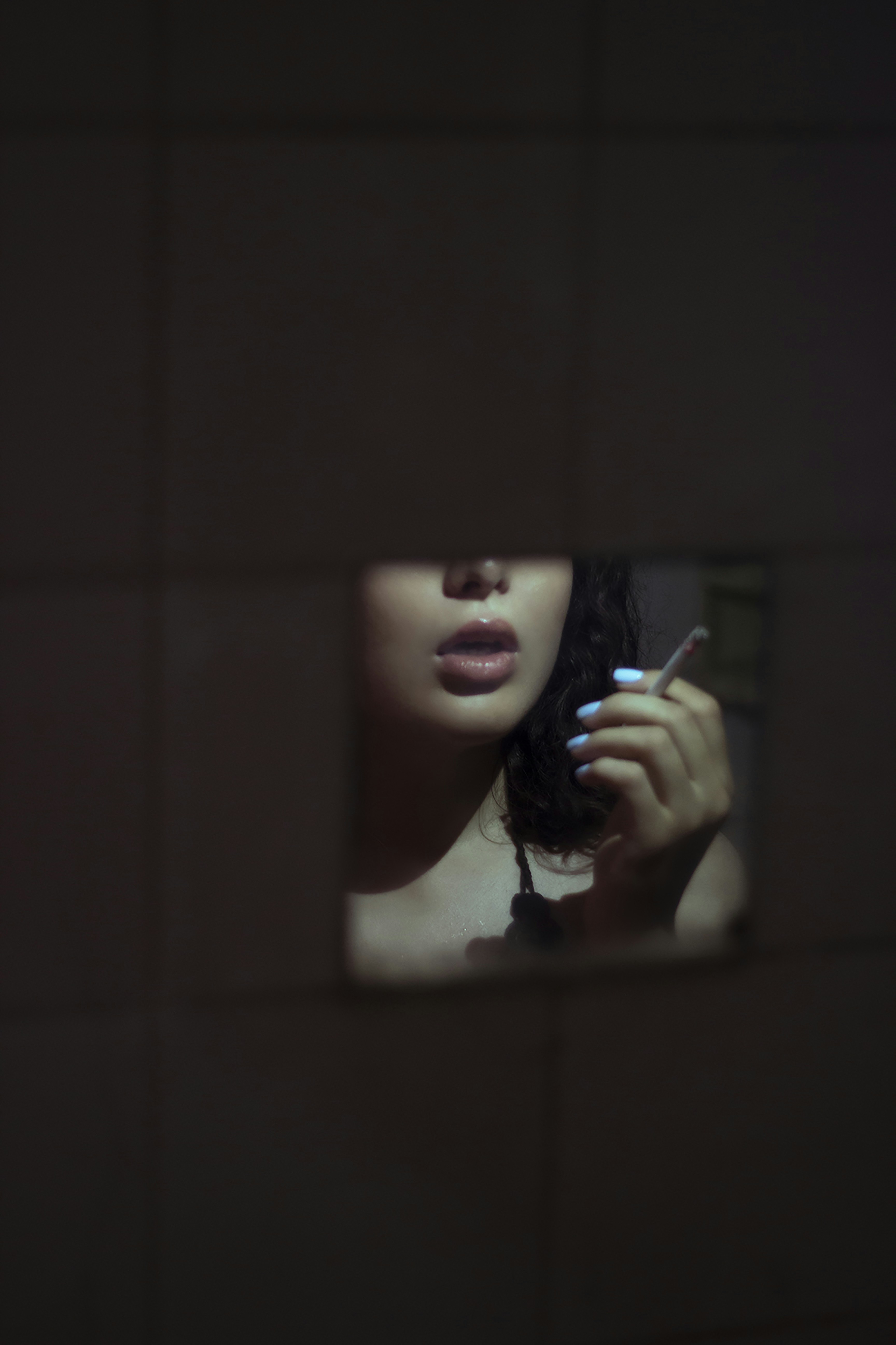 Through a Small Hearth: A Quiet Whisper of Lip and Smoke