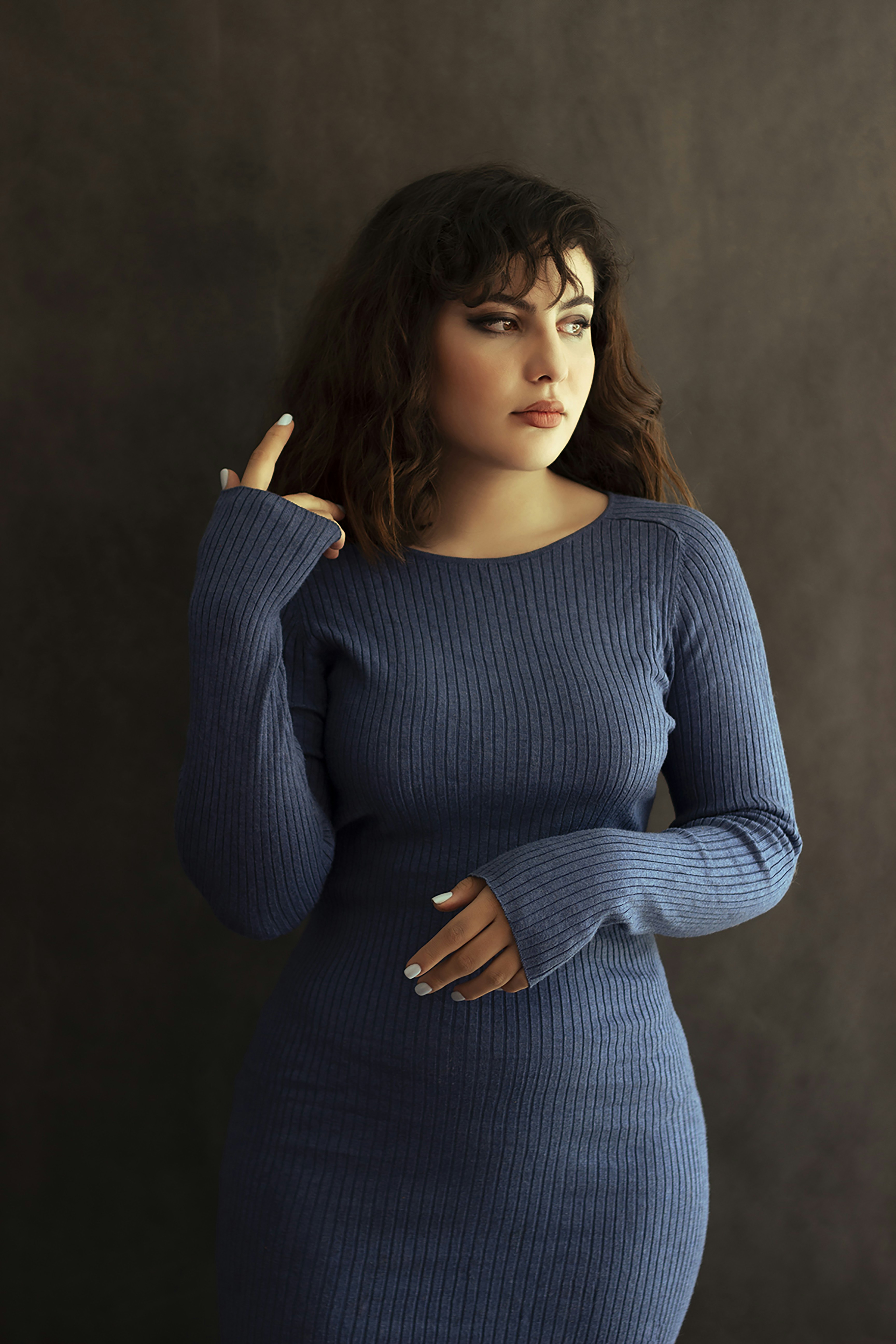 A woman in a blue dress posing for a picture photo – Free Tabriz Image ...