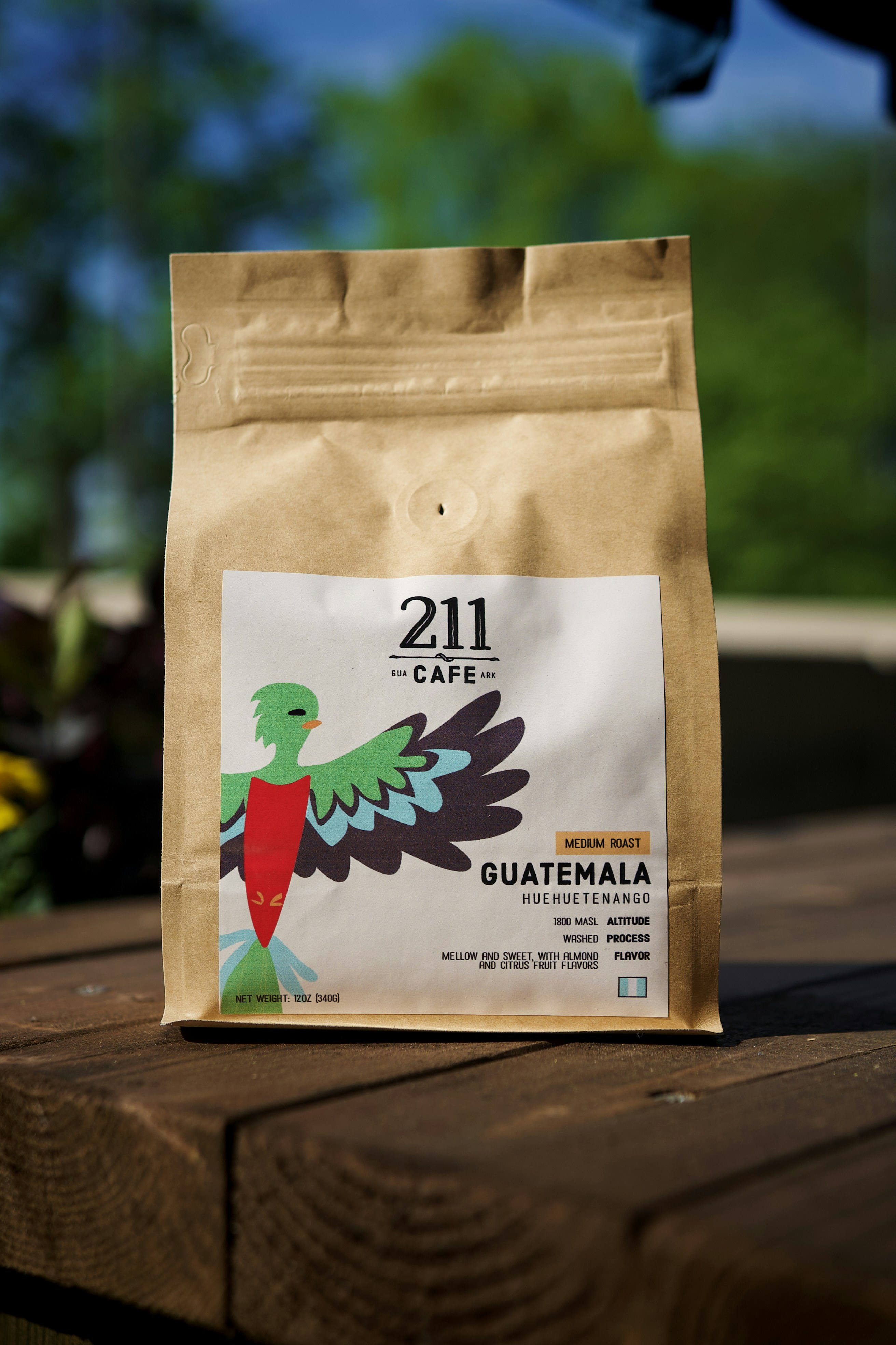 Guatemala Roast in Focus: 211 Café Coffee Bag on Weathered Wood