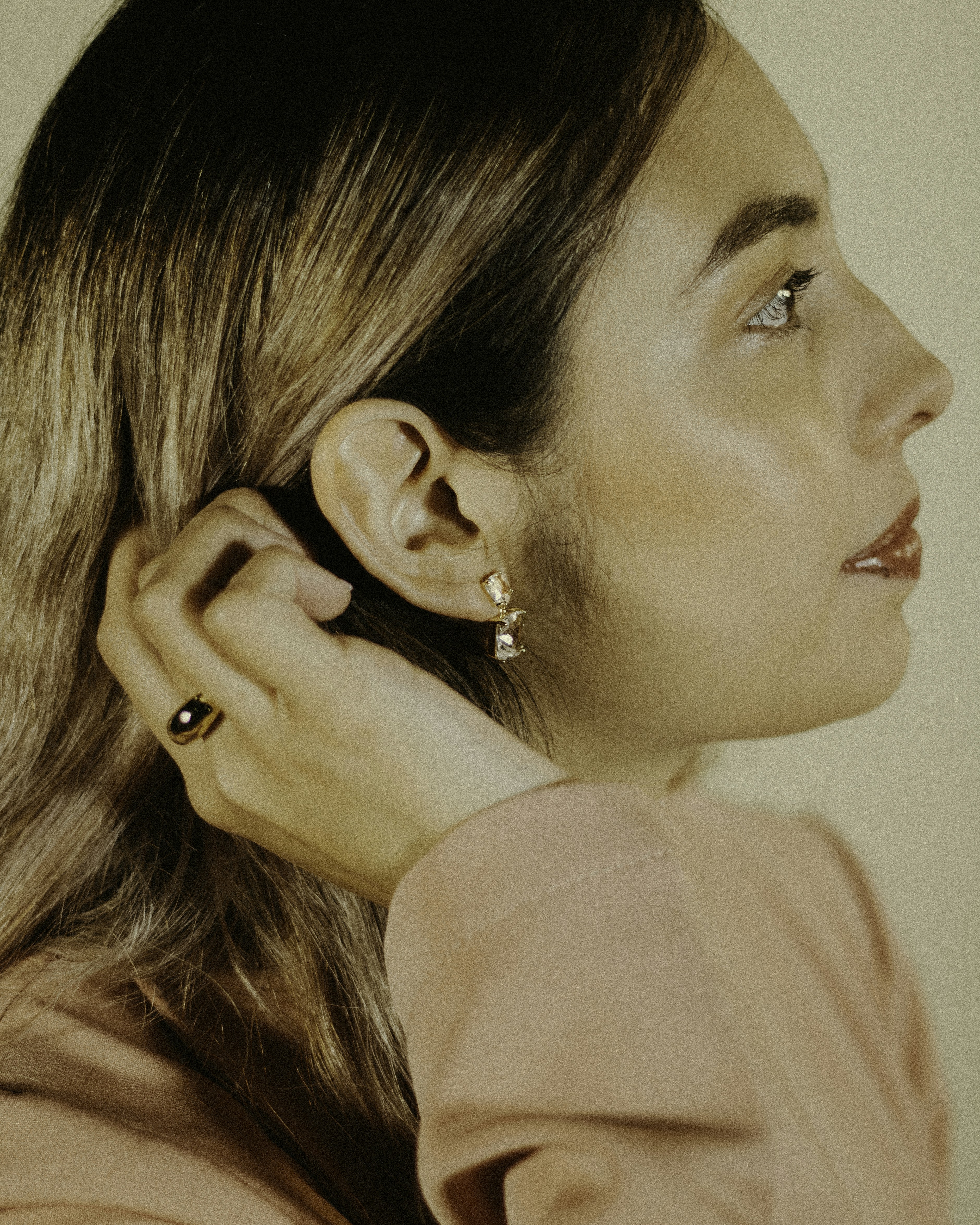 A woman wearing a pair of ear piercings photo – Free Jewelry Image on ...