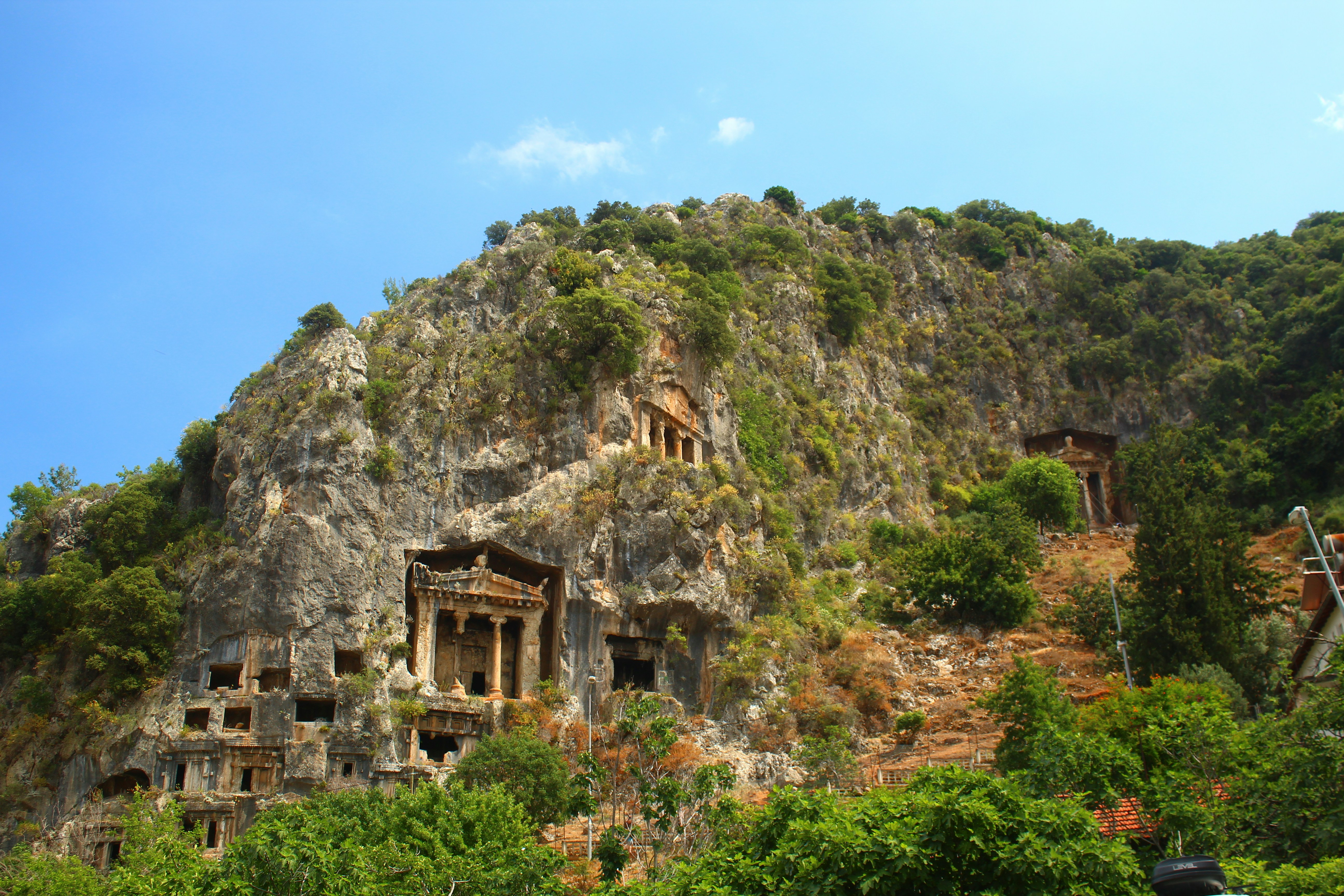 Carved Echoes on a Sunlit Hillside