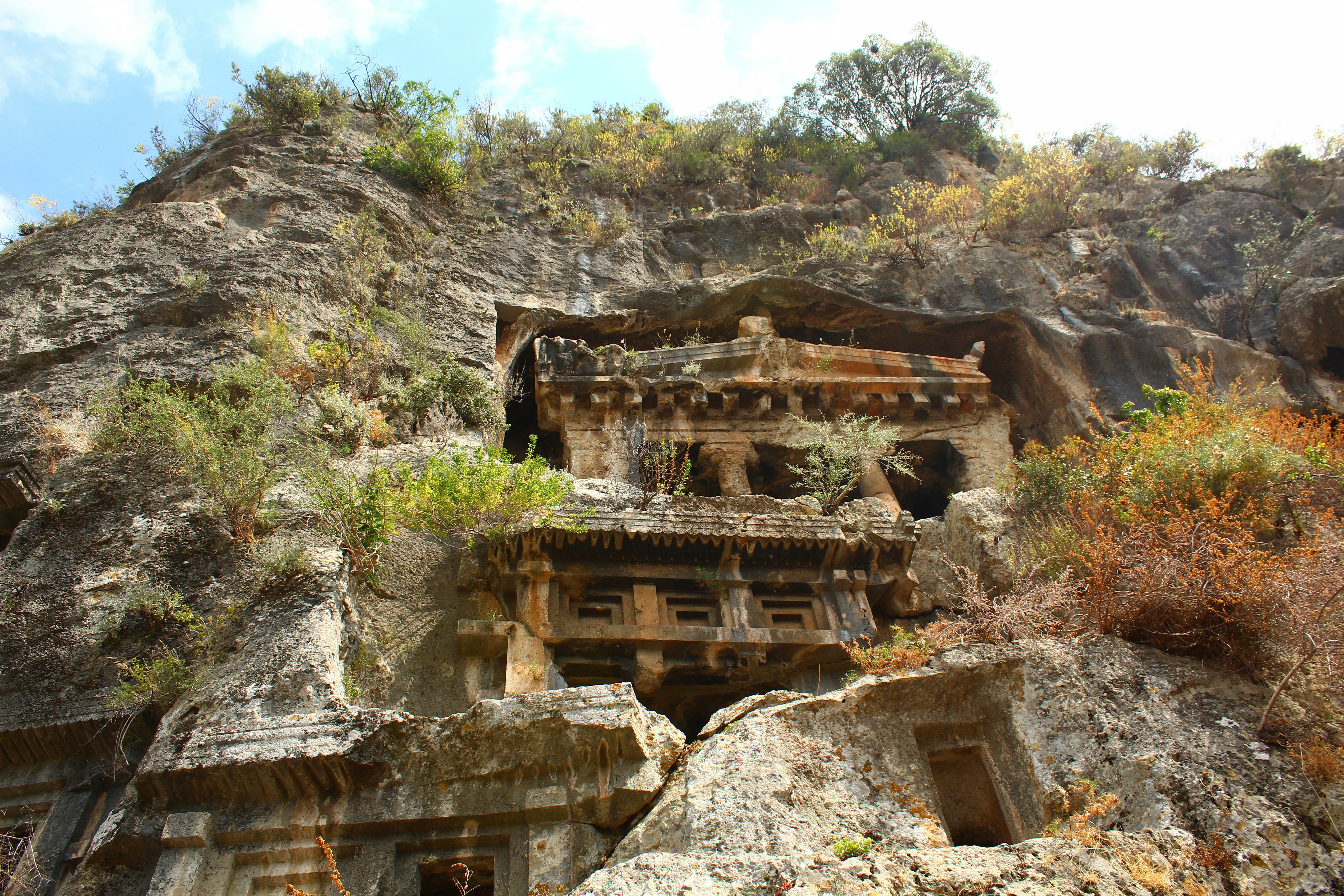 A large rock formation with a building on top of it photo – Free Spring ...