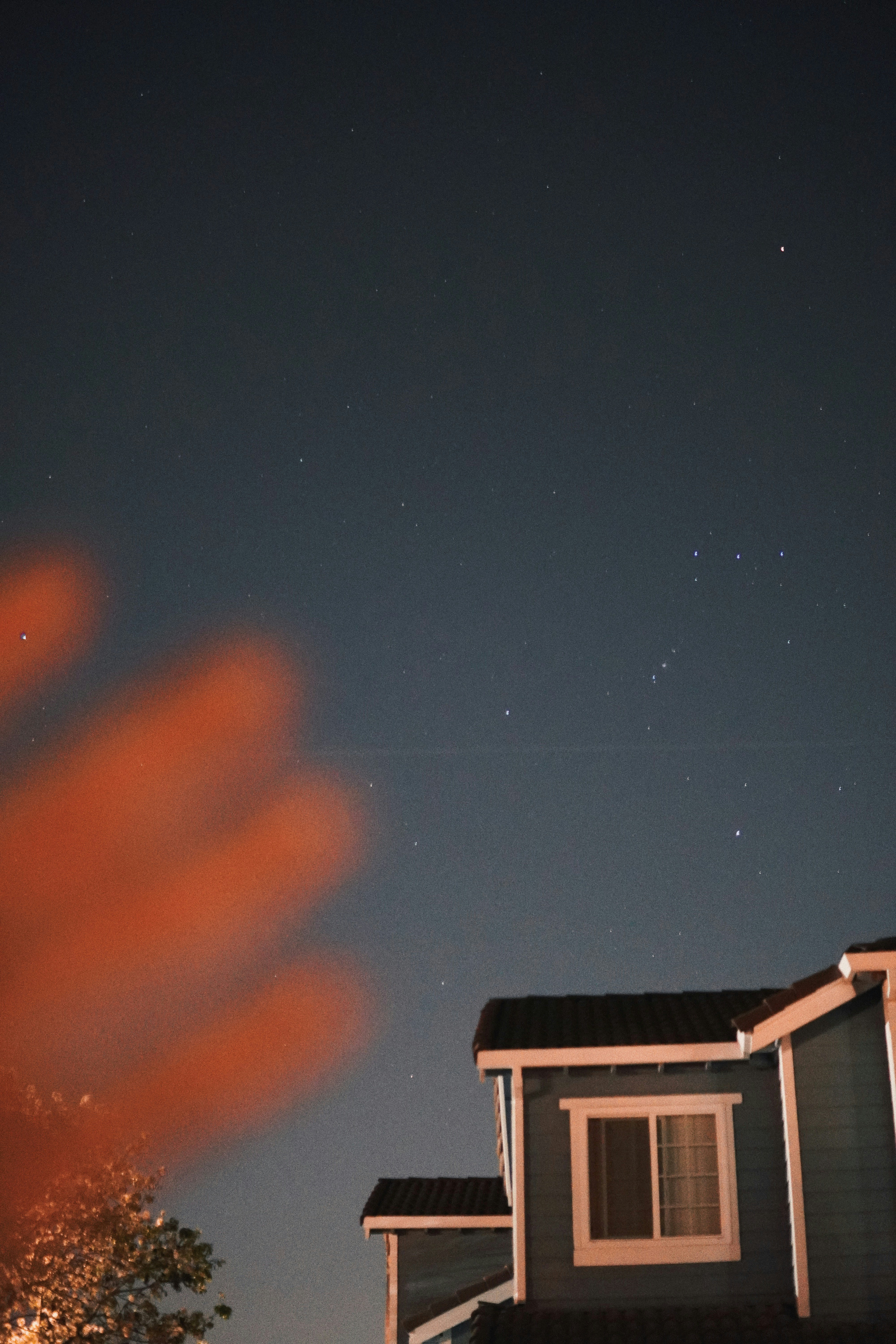 Blue Cottage Beneath a Quiet Star-Filled Sky