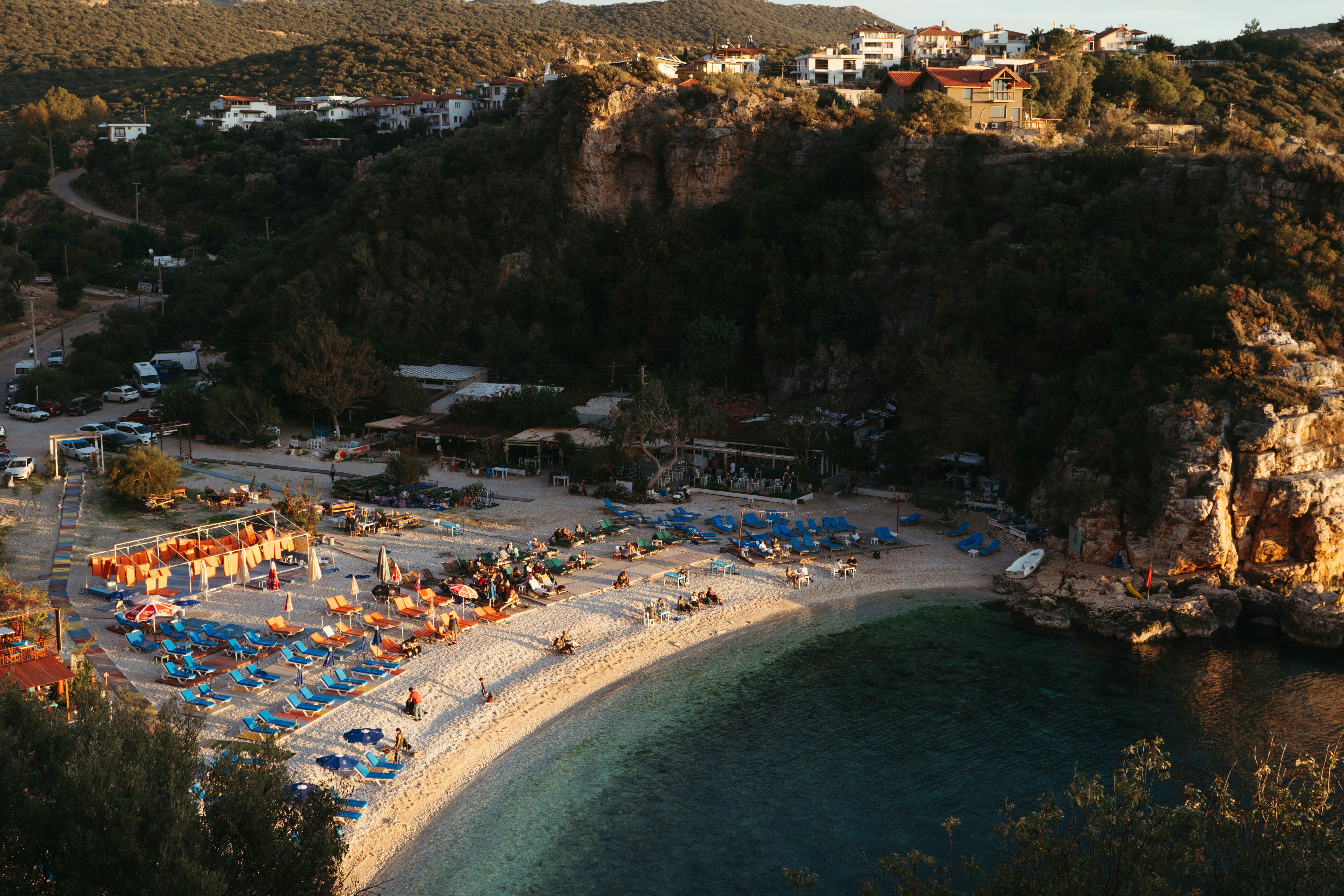 Sunlit Cove: A Quiet Beach Flanked by Cedar-clad cliffs