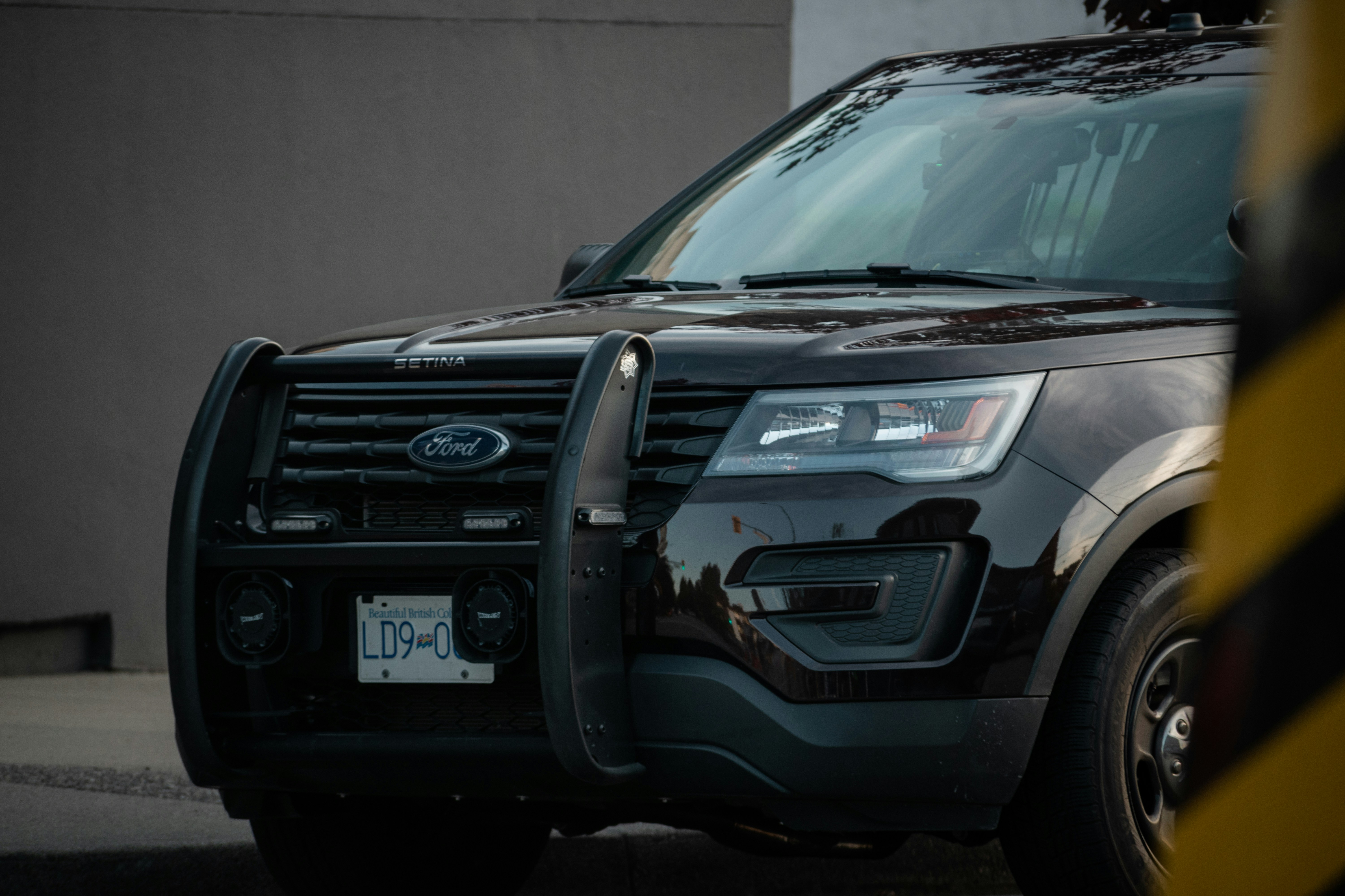 A police car parked on the side of the road photo – Free Bc Image on ...