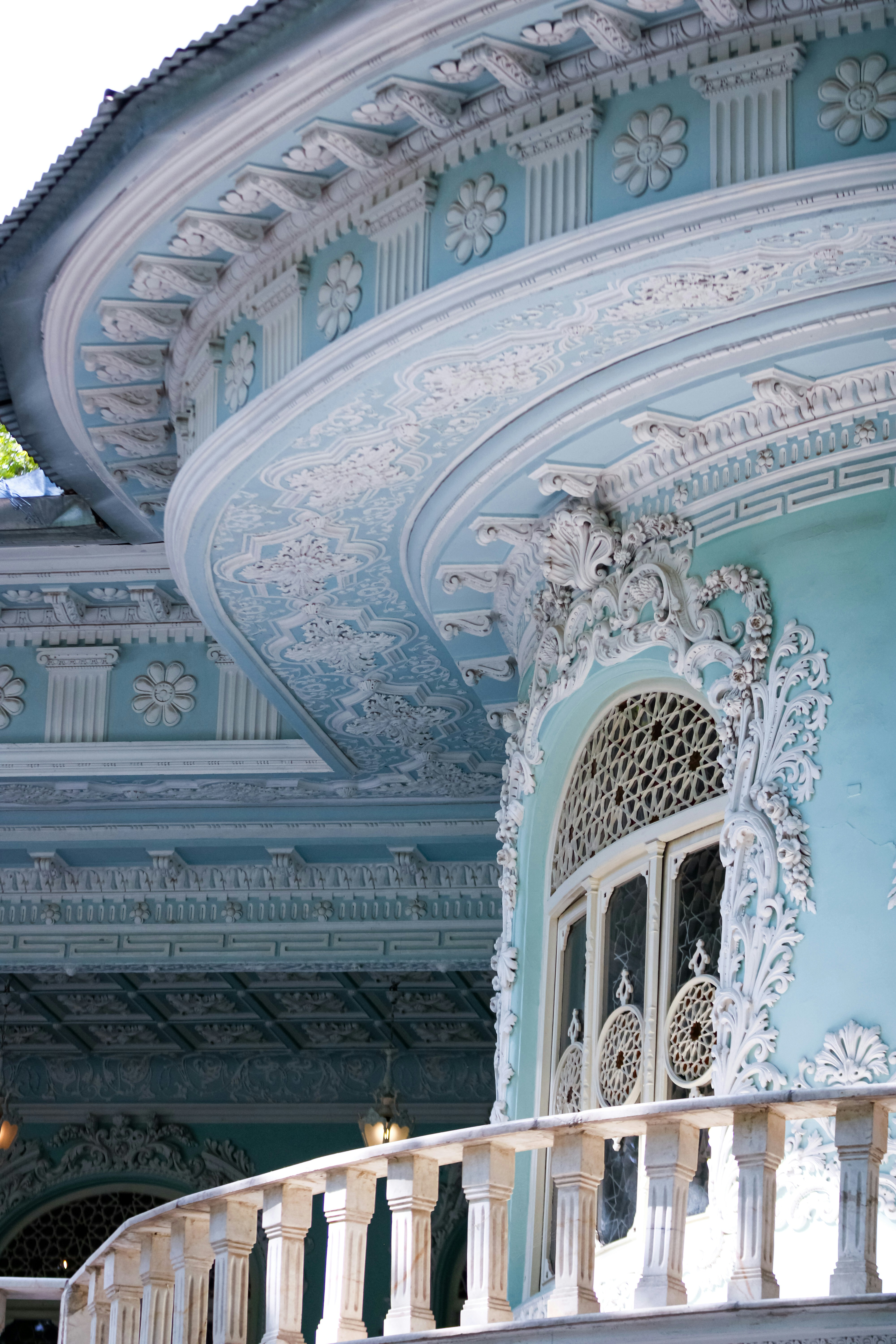 A blue and white building with a balcony photo – Free Tehran Image on ...