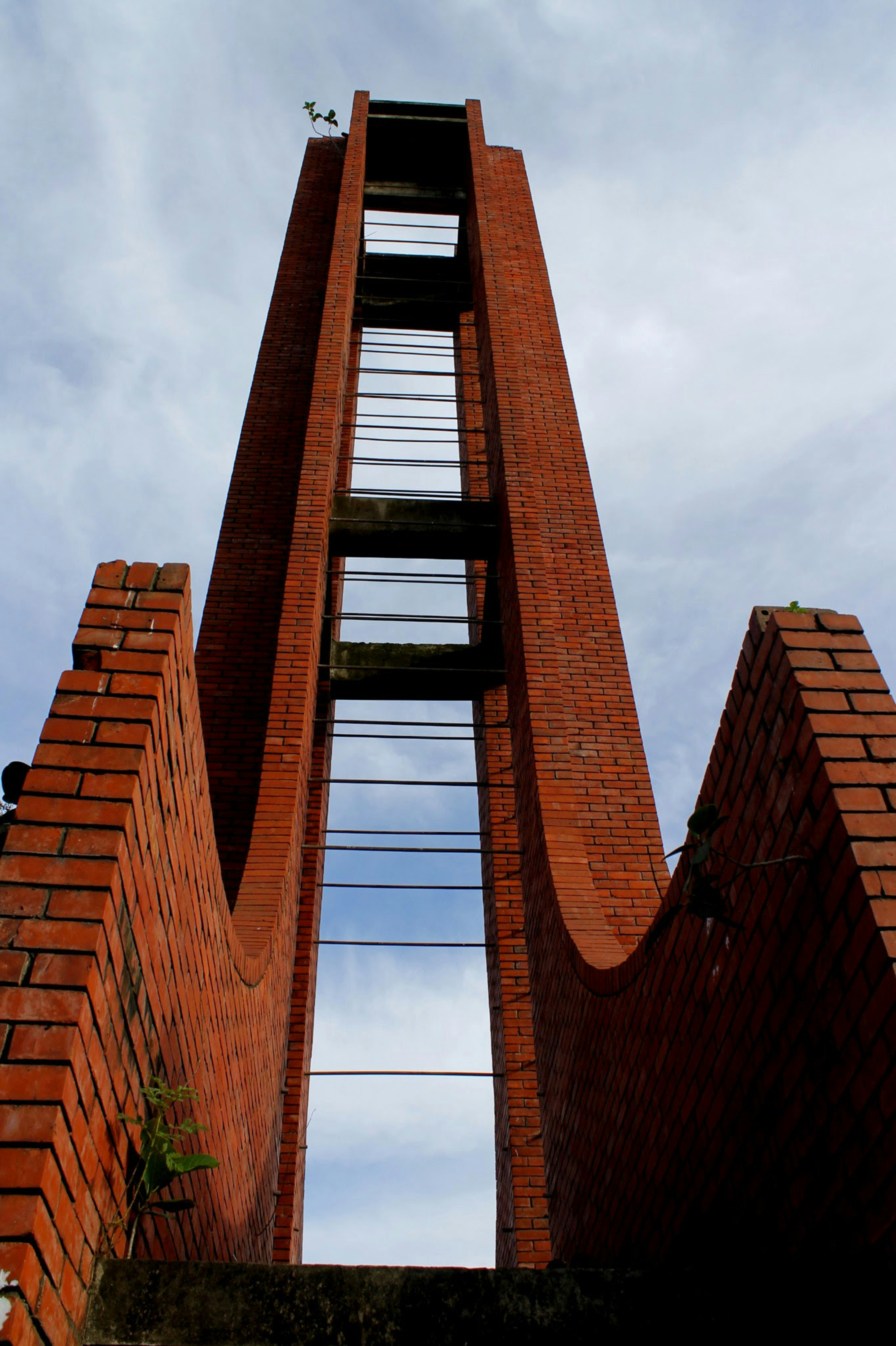 A tall brick tower with a sky background photo – Free Dhaka Image on ...