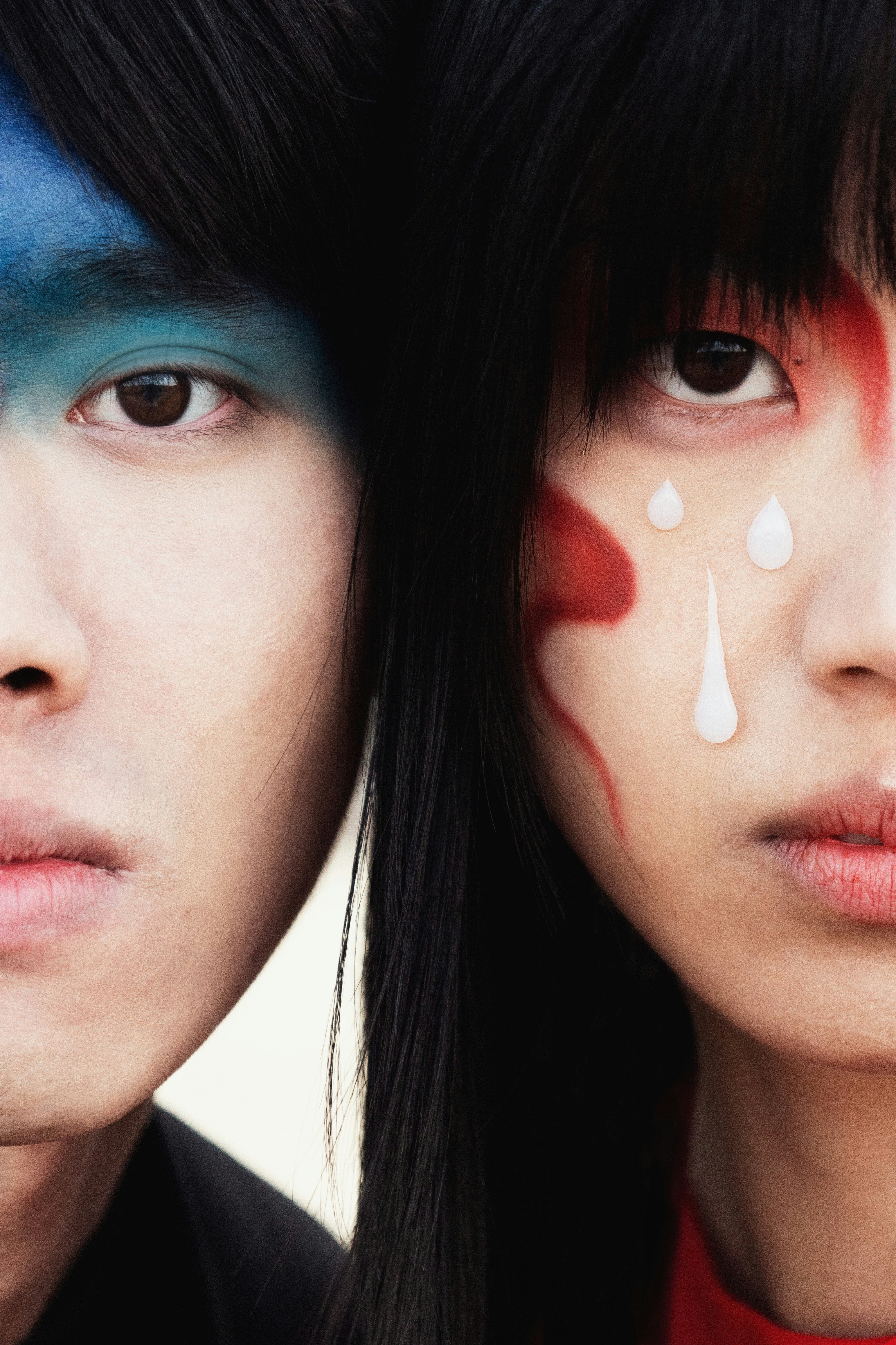 A couple of people with painted on their faces photo – Free Head Image ...