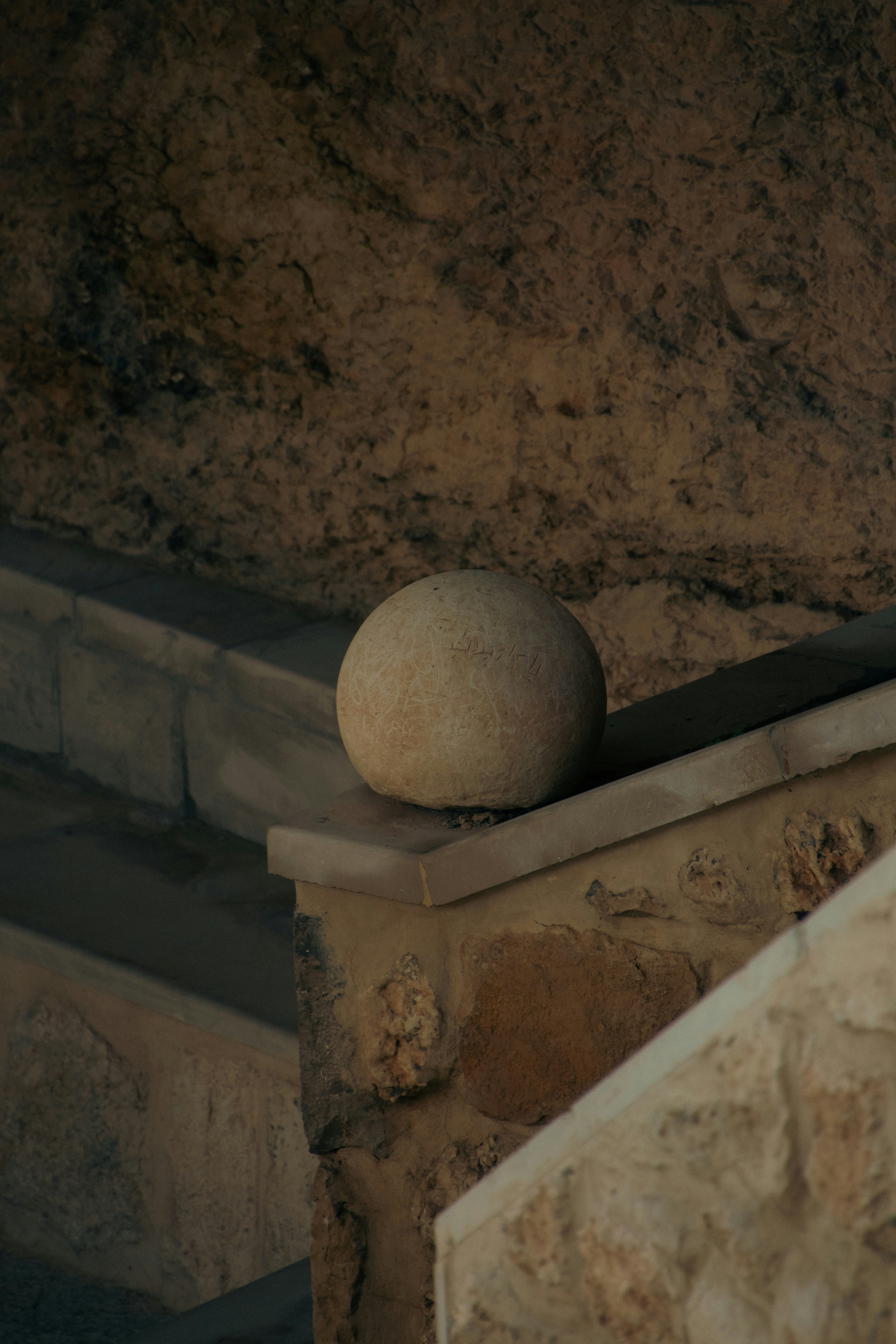A Weathered Sphere Guards the Stone Veil