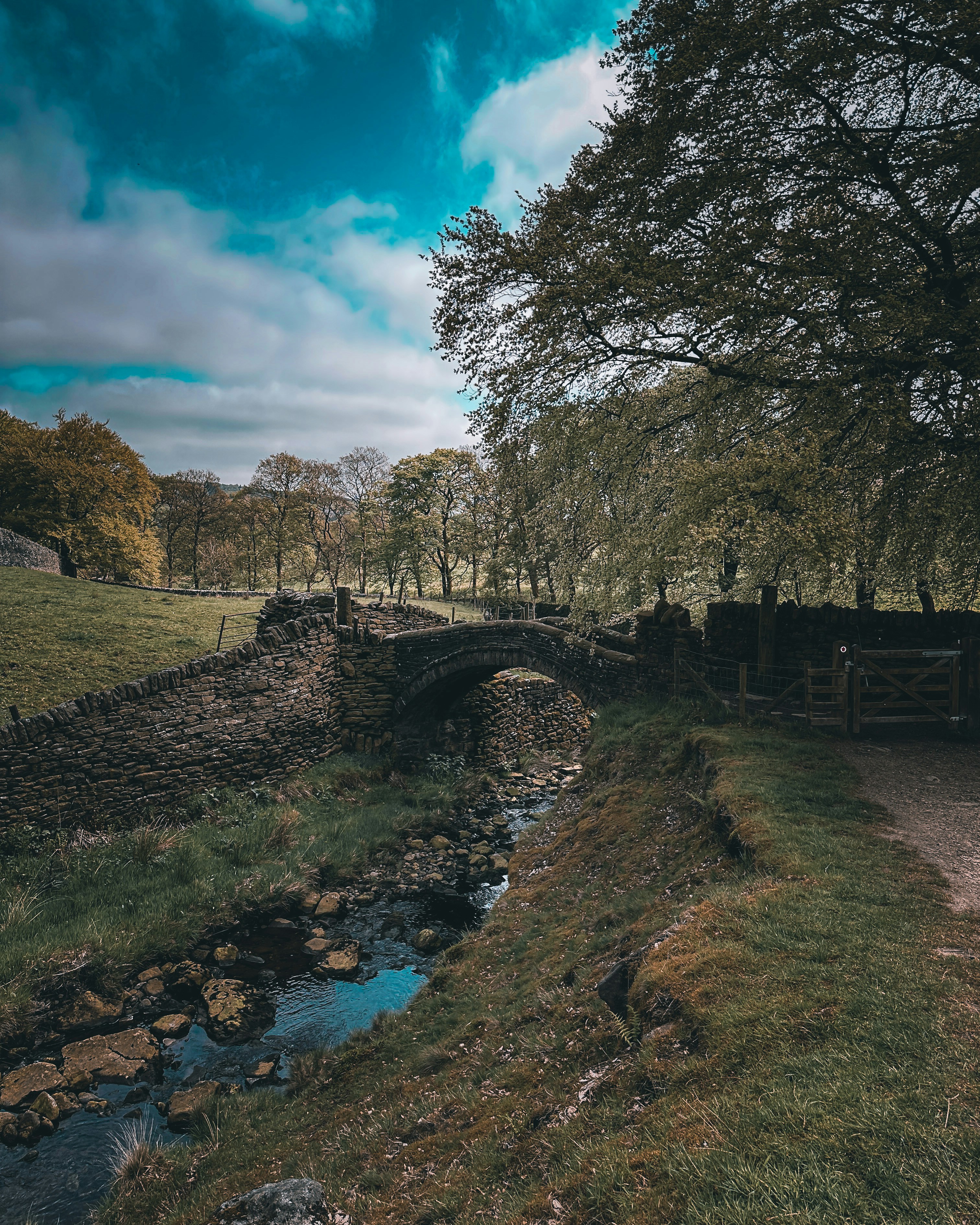 A small bridge over a small stream in a field photo – Free Marsden moor ...