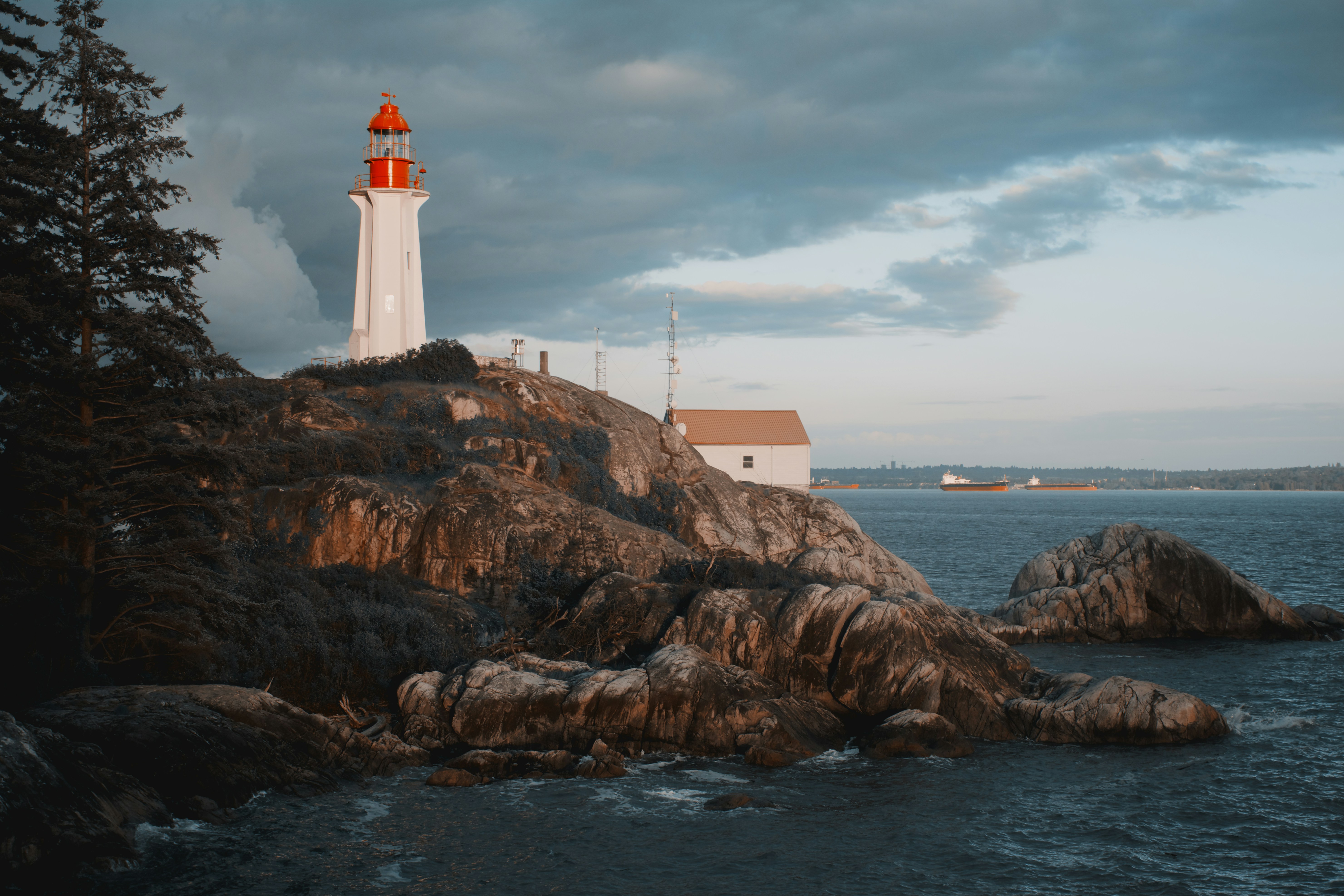 Granite Promontory Lighthouse at Coastal Twilight