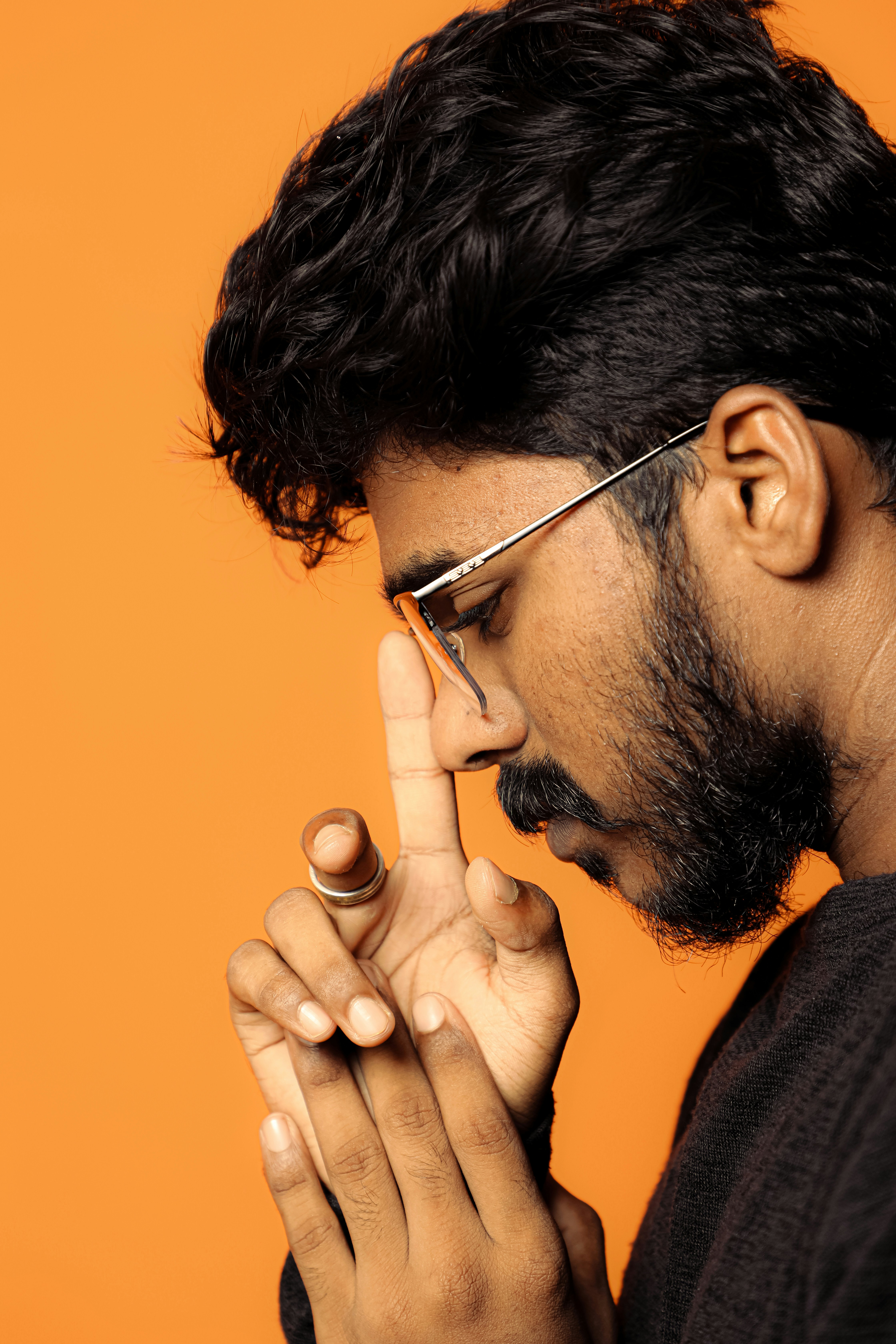 Quiet Intention: A Portrait in Orange Silence