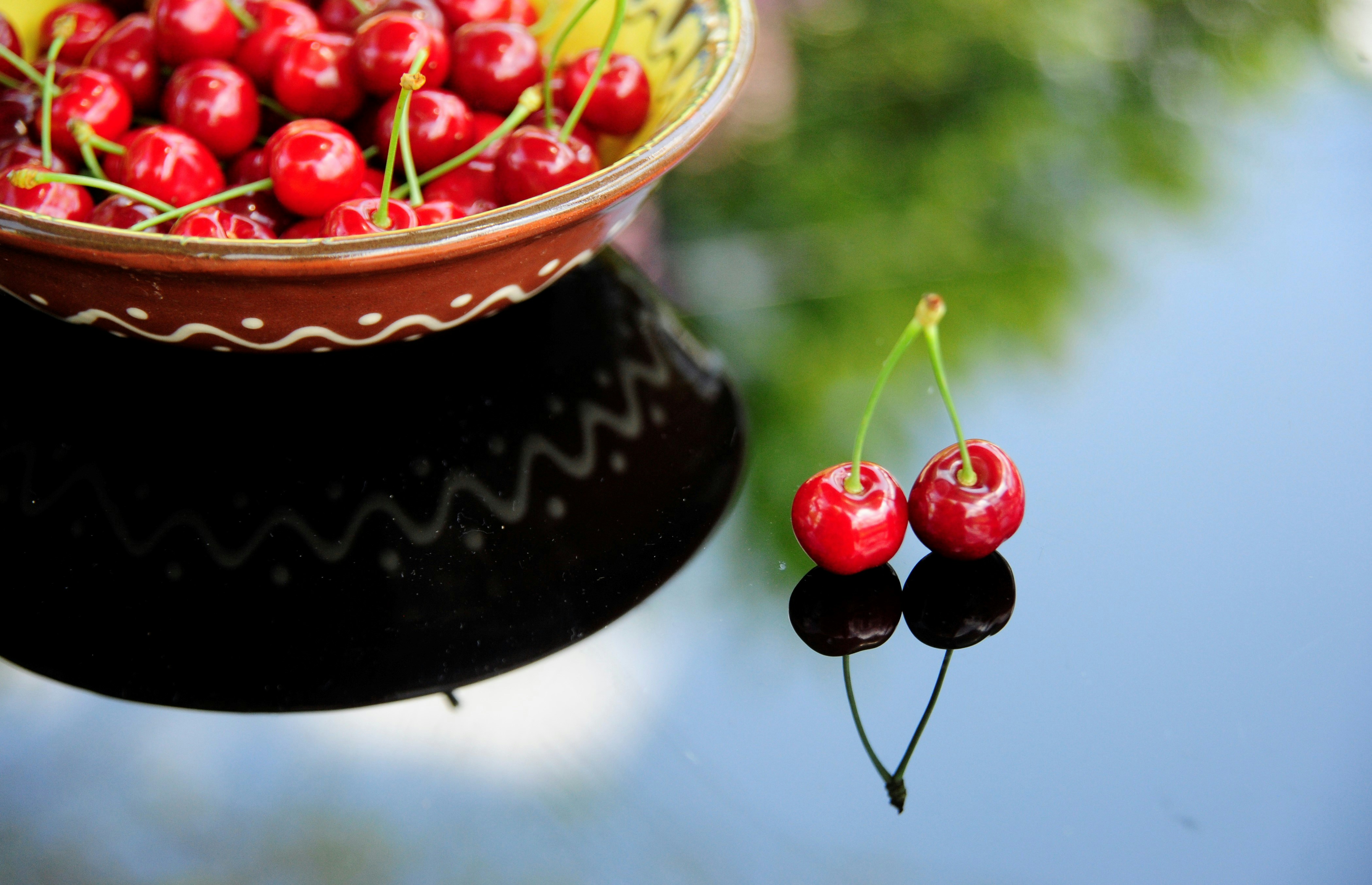 Mirror-Red: A Quiet Still-Life of Cherries and Reflection