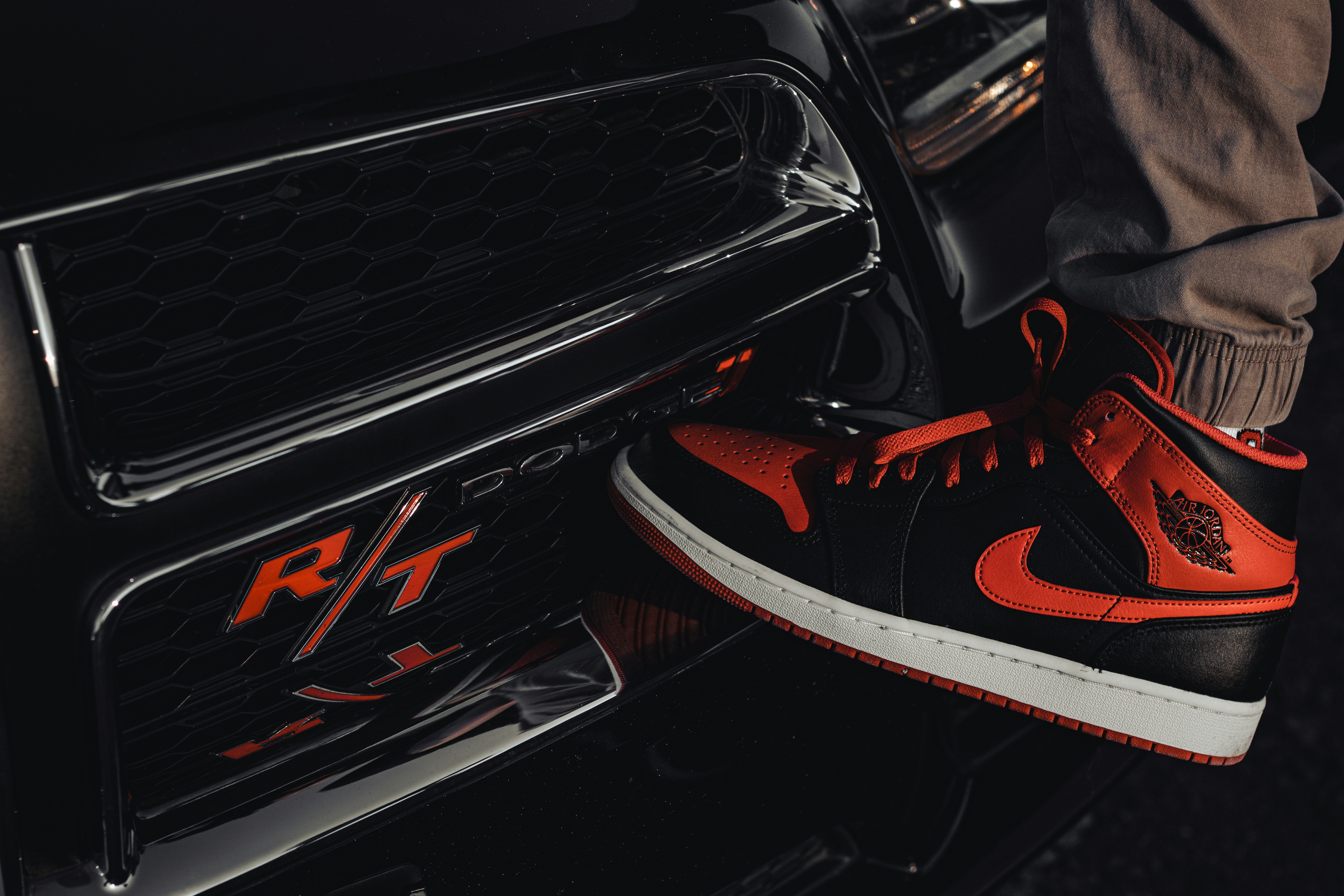 R/T at Close Range: Red-Black Jordan Bracing the Car's Aggressive Front
