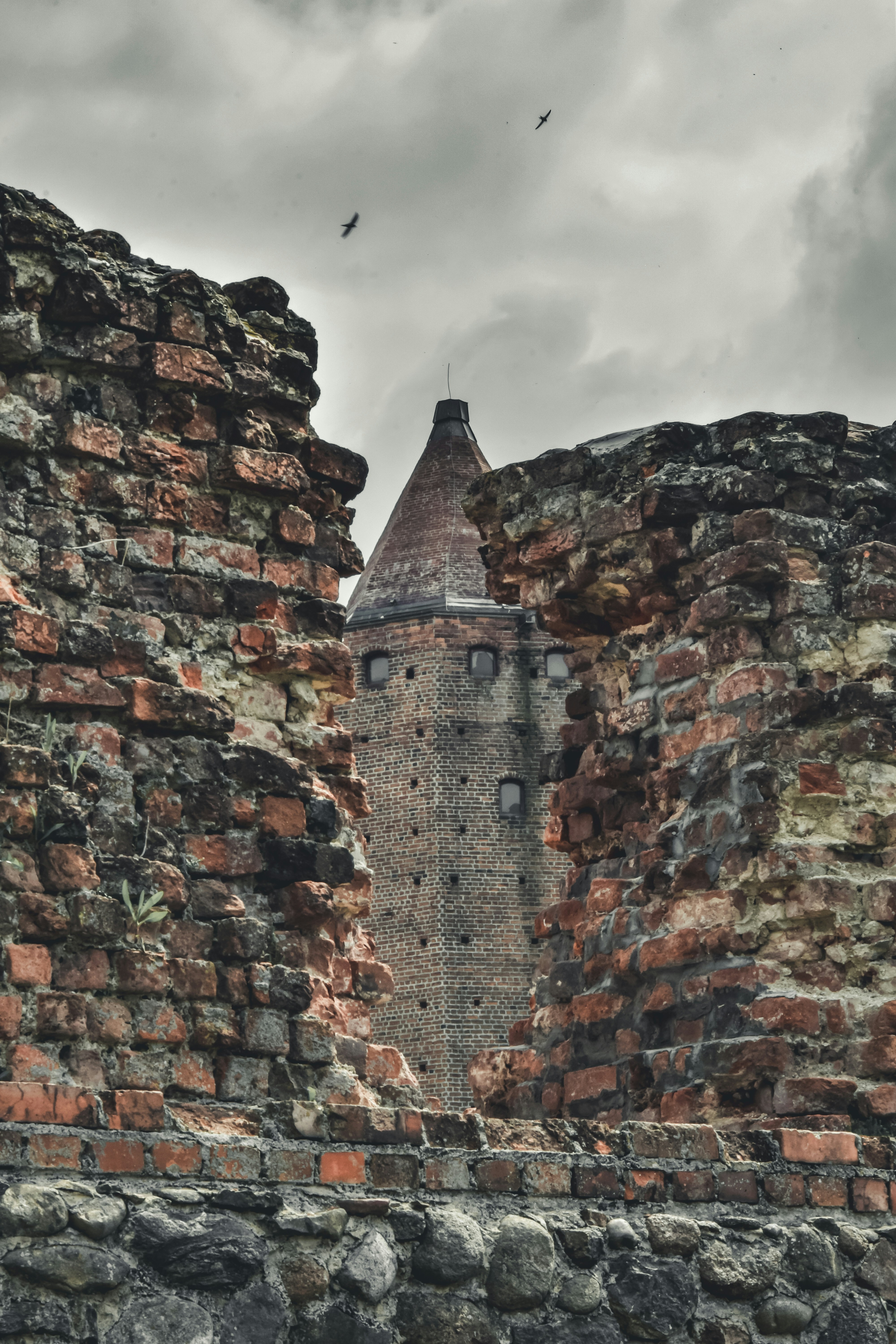 Conical Crown Rising Between Time-Worn Walls