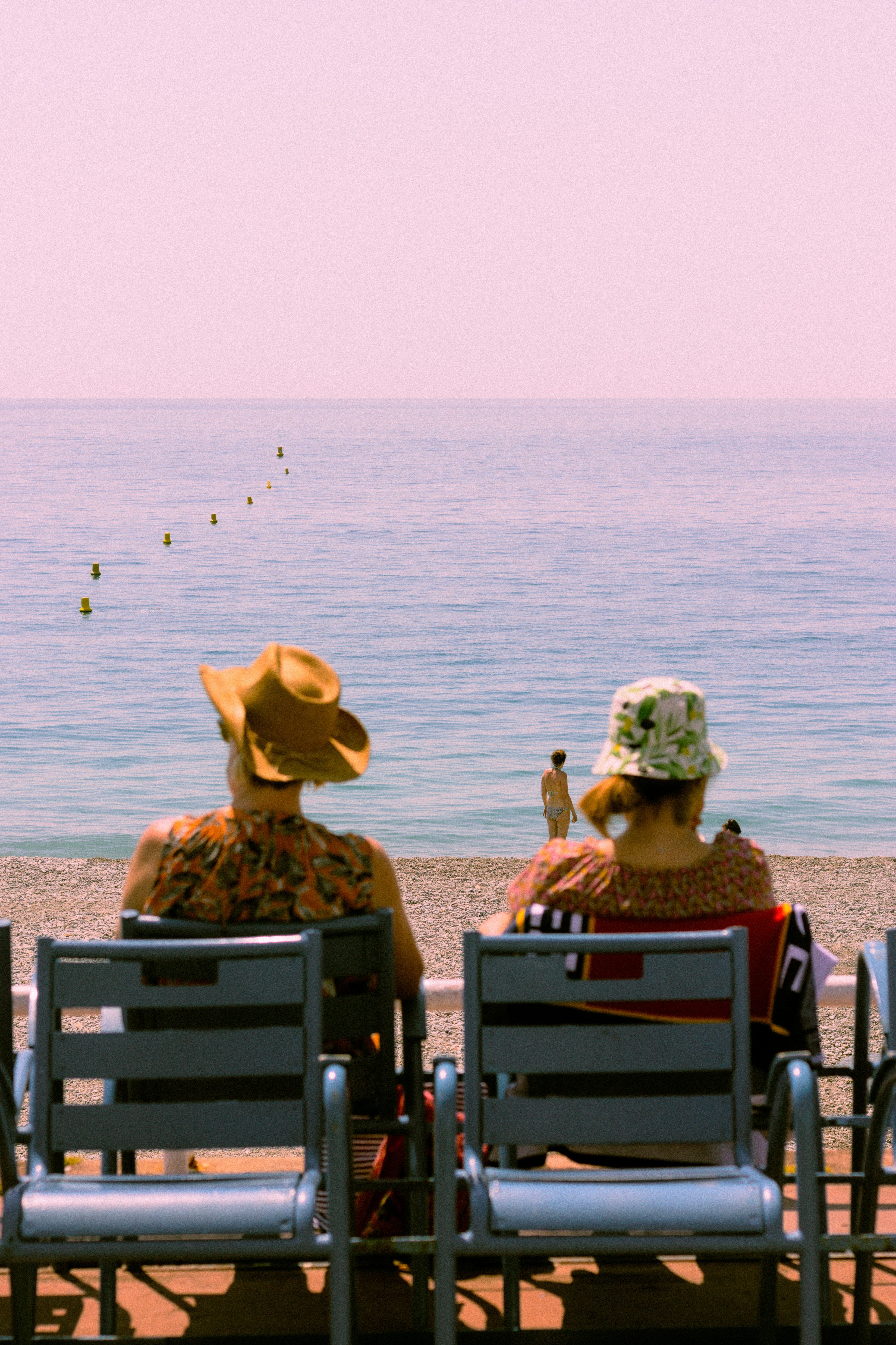 Two women in front of the sea