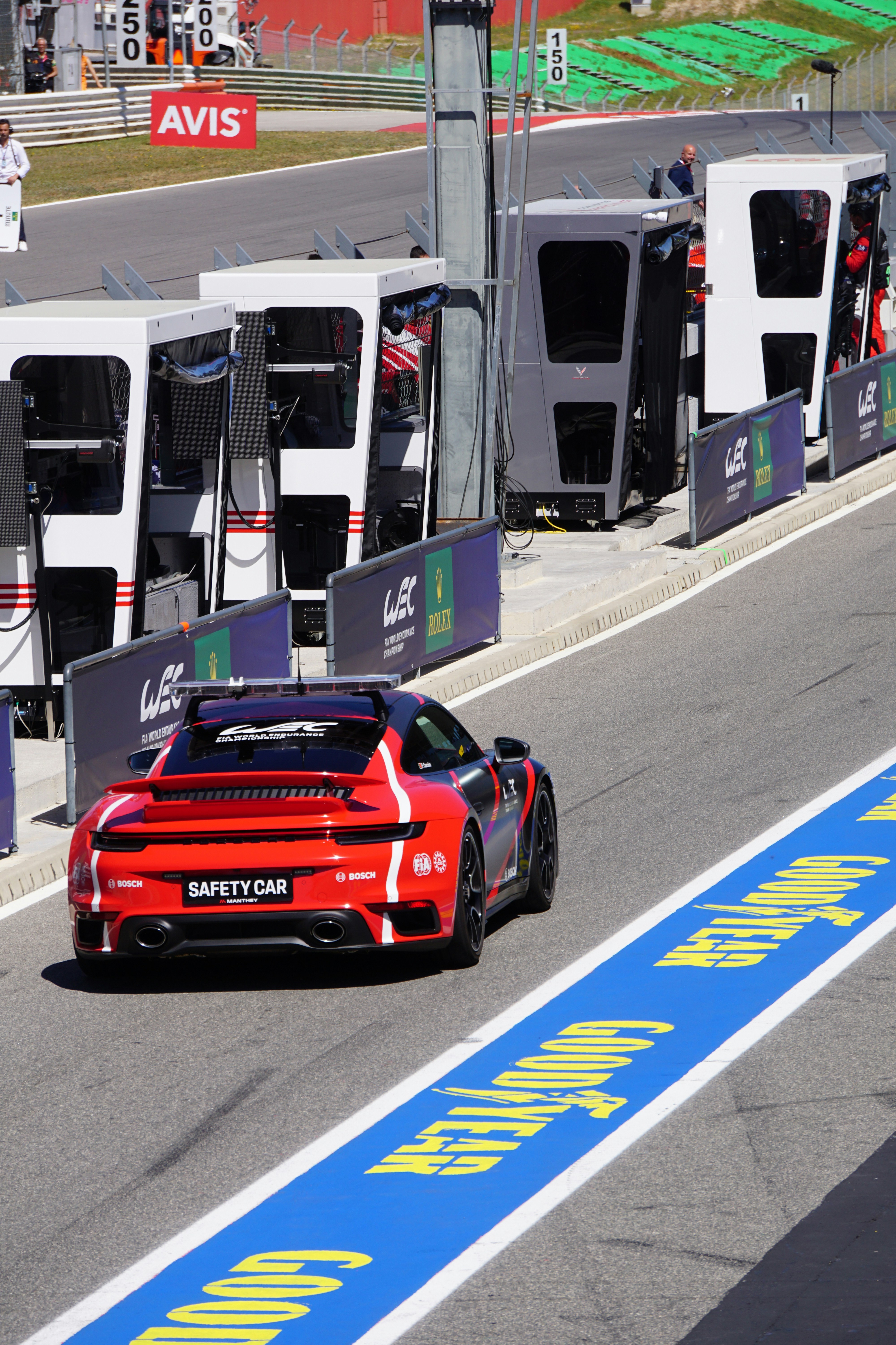 A red sports car driving down a race track photo – Free Wec 2023 Image ...