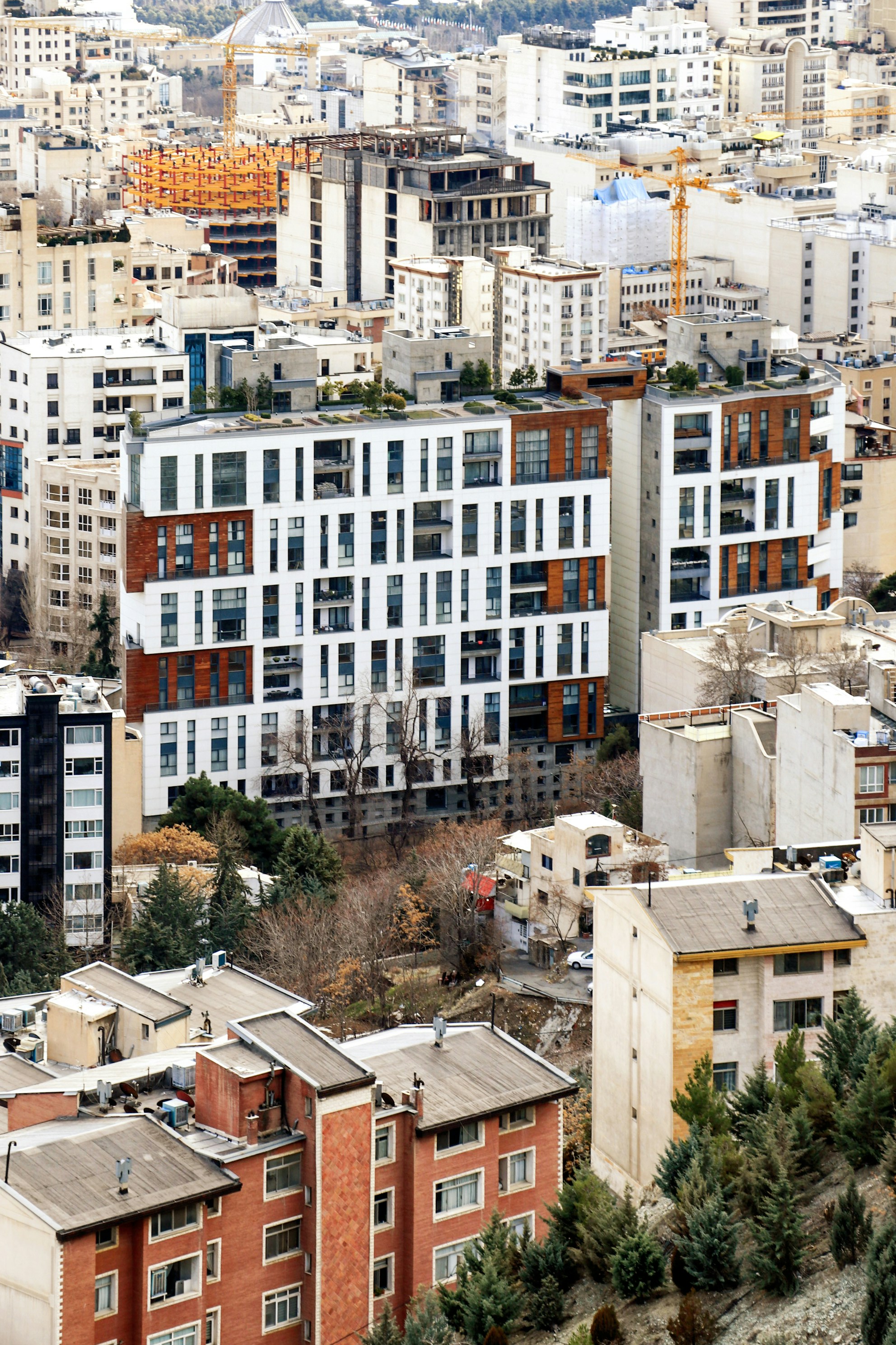 Gridscape in Concrete: The White-Facade Complex Rising Above a Sea of Blocks
