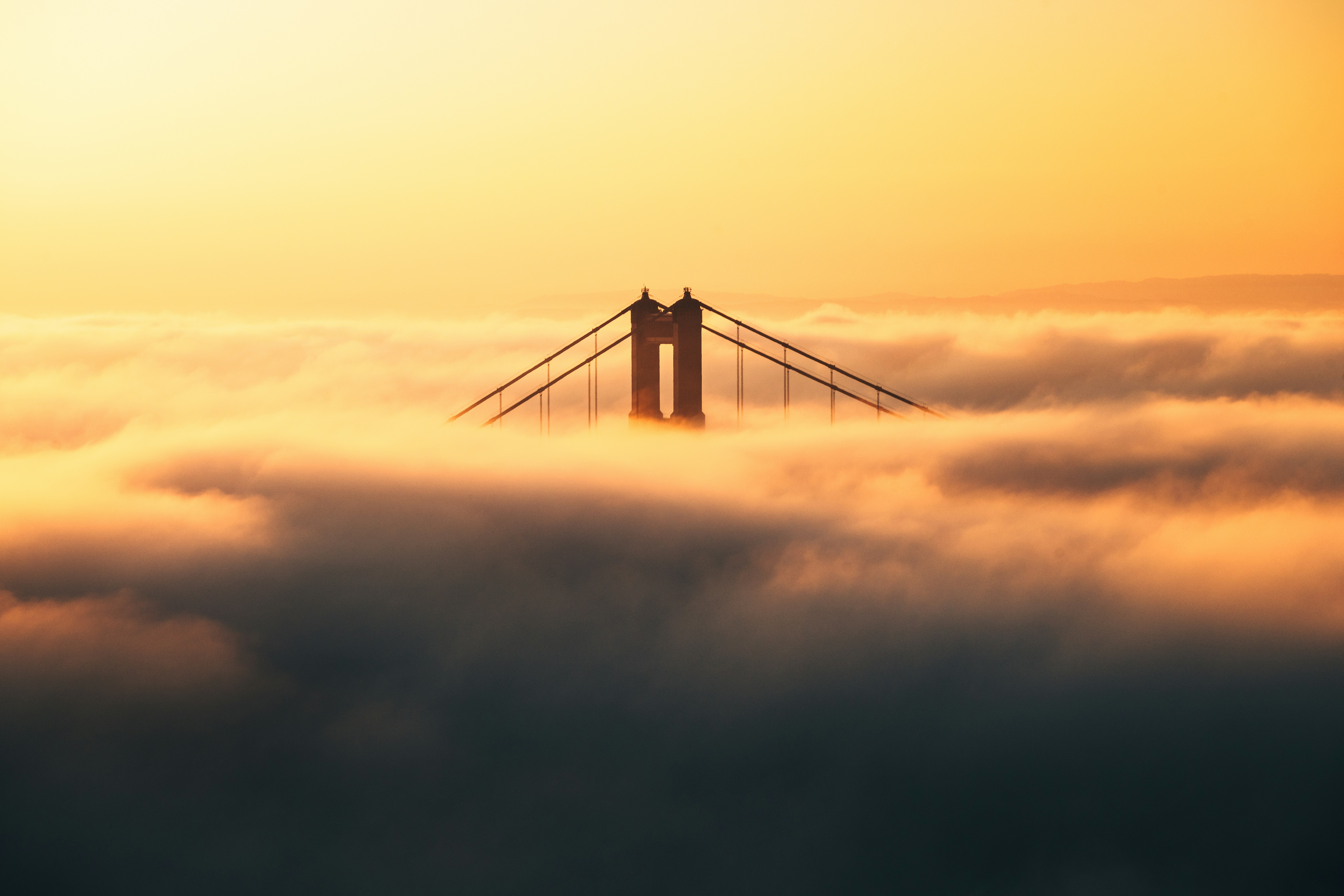 A bridge in the middle of a sea of clouds photo – Free Bridge Image on ...