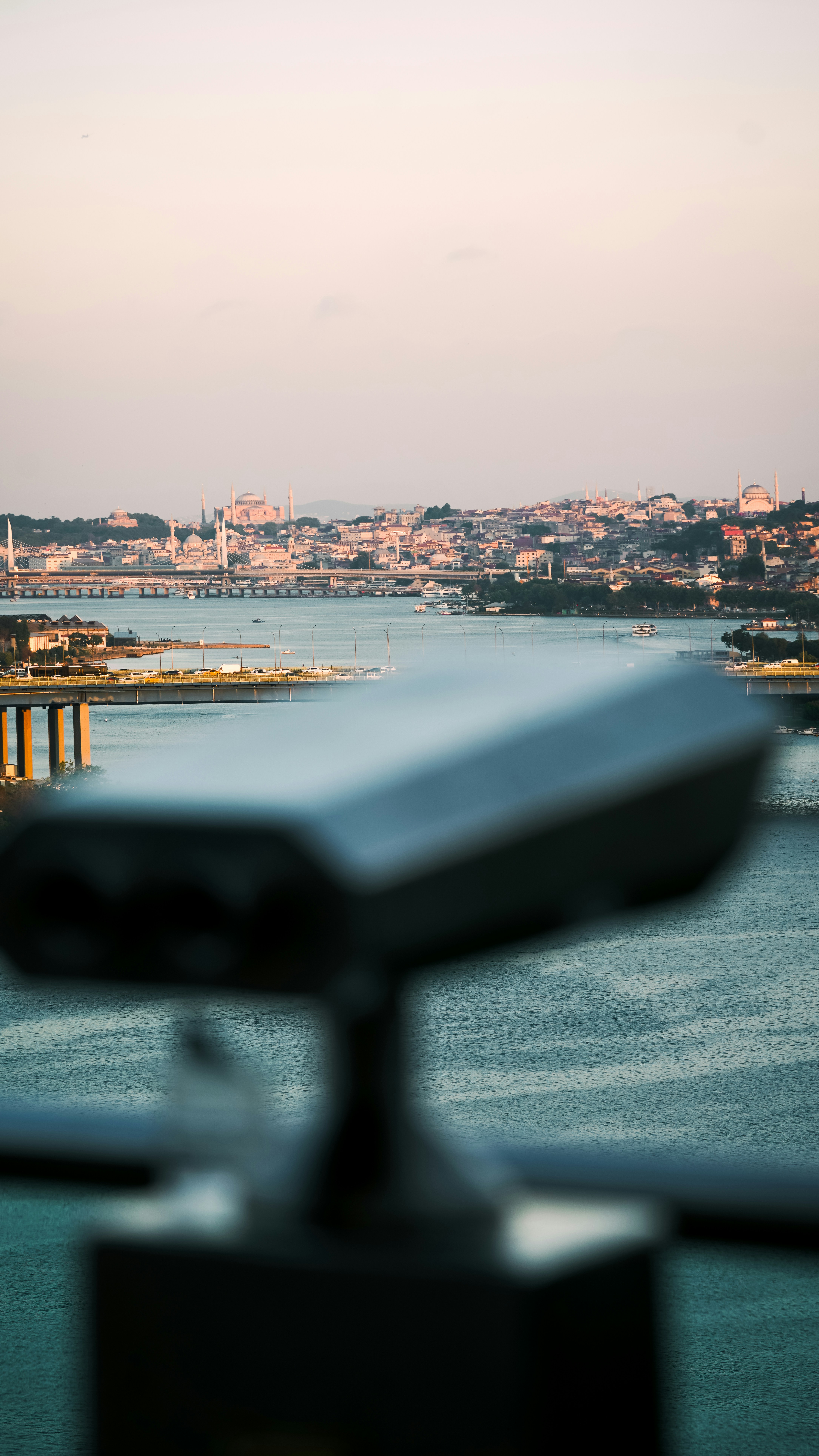 Horizon Through a Foreground Scope: Harbor Silhouette in Soft Focus
