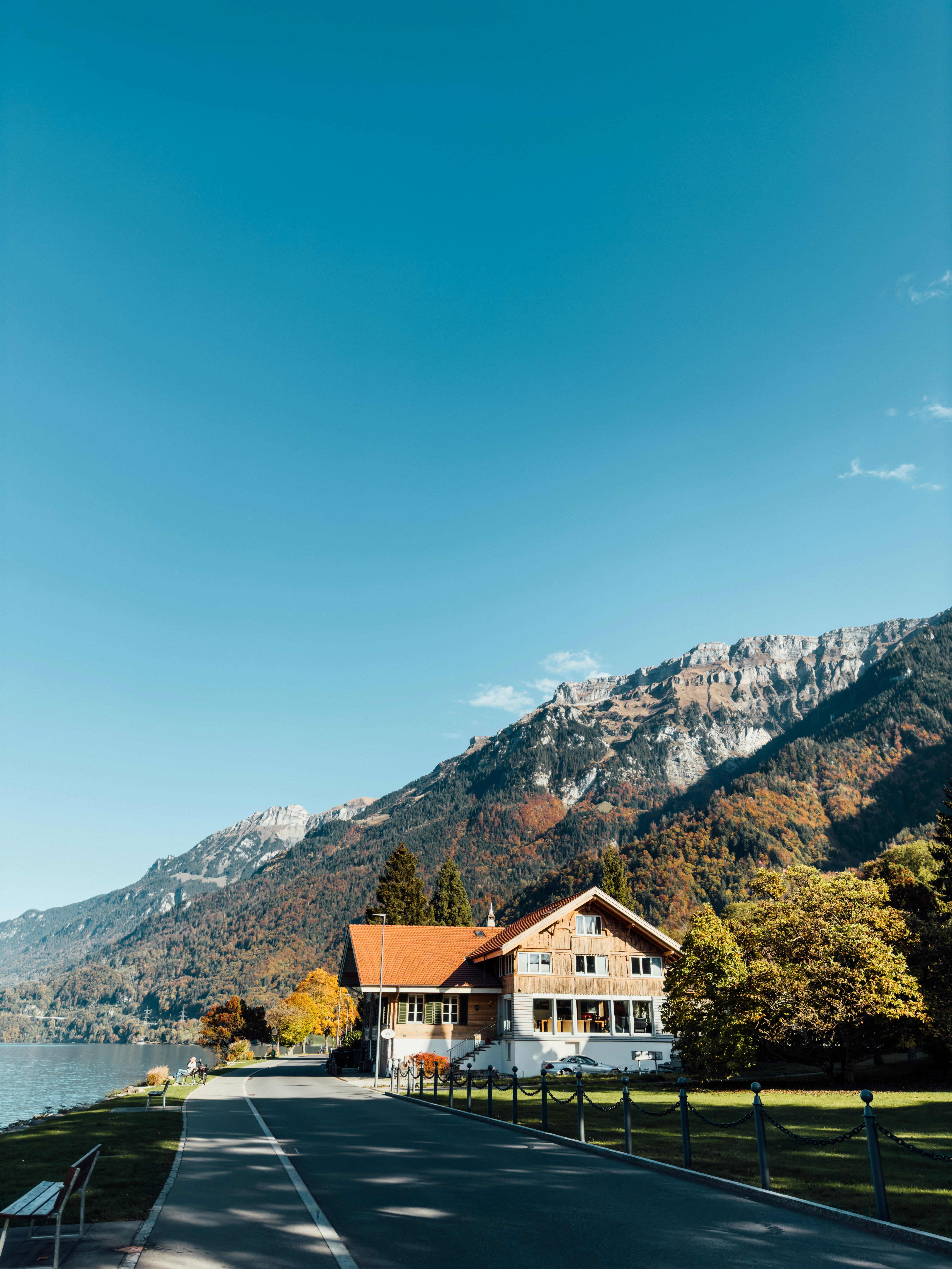 Lakeside Chalet Beneath Snowy Peaks
