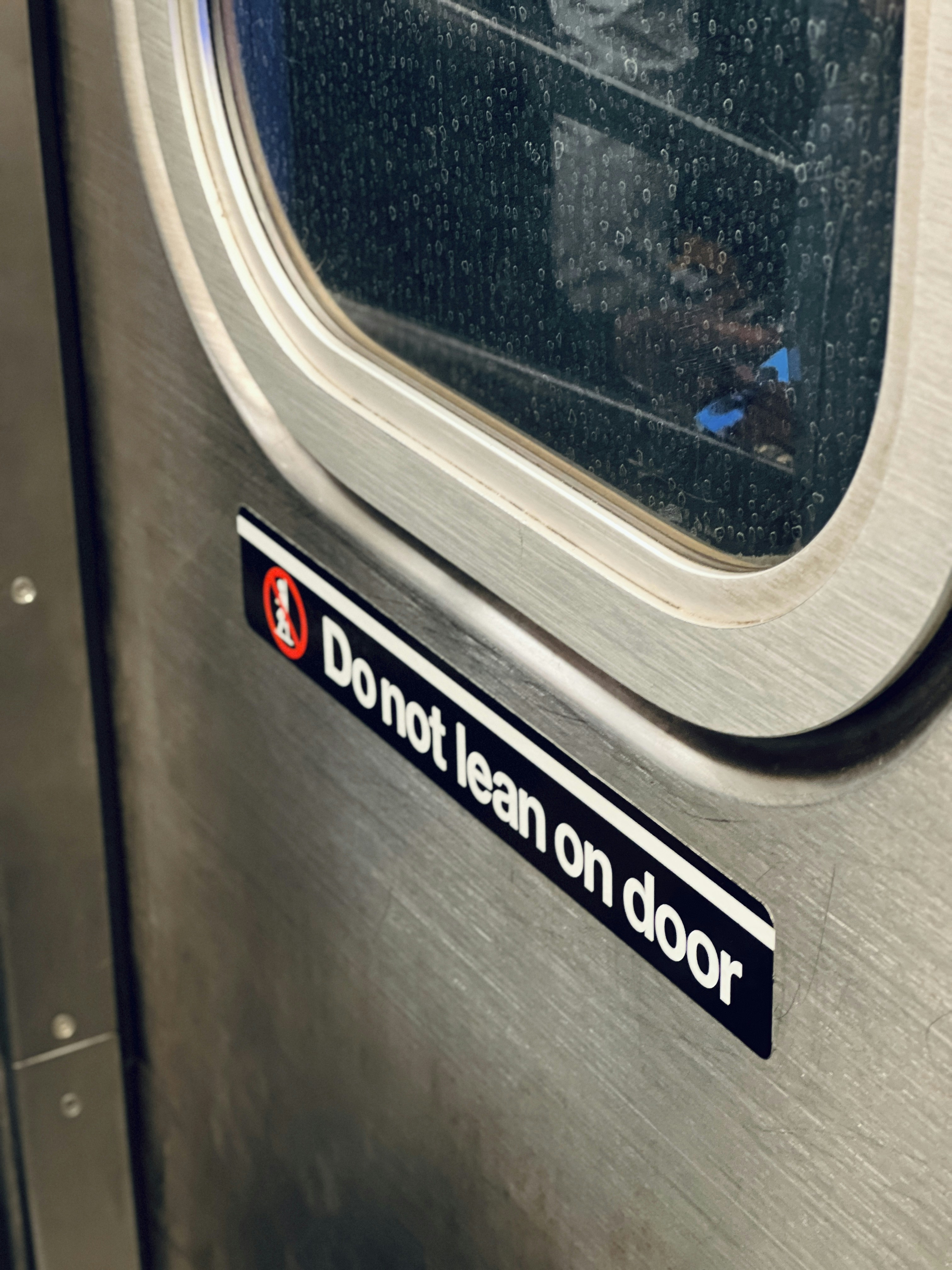 A door with a sticker that says don't lean on door photo – Free New ...