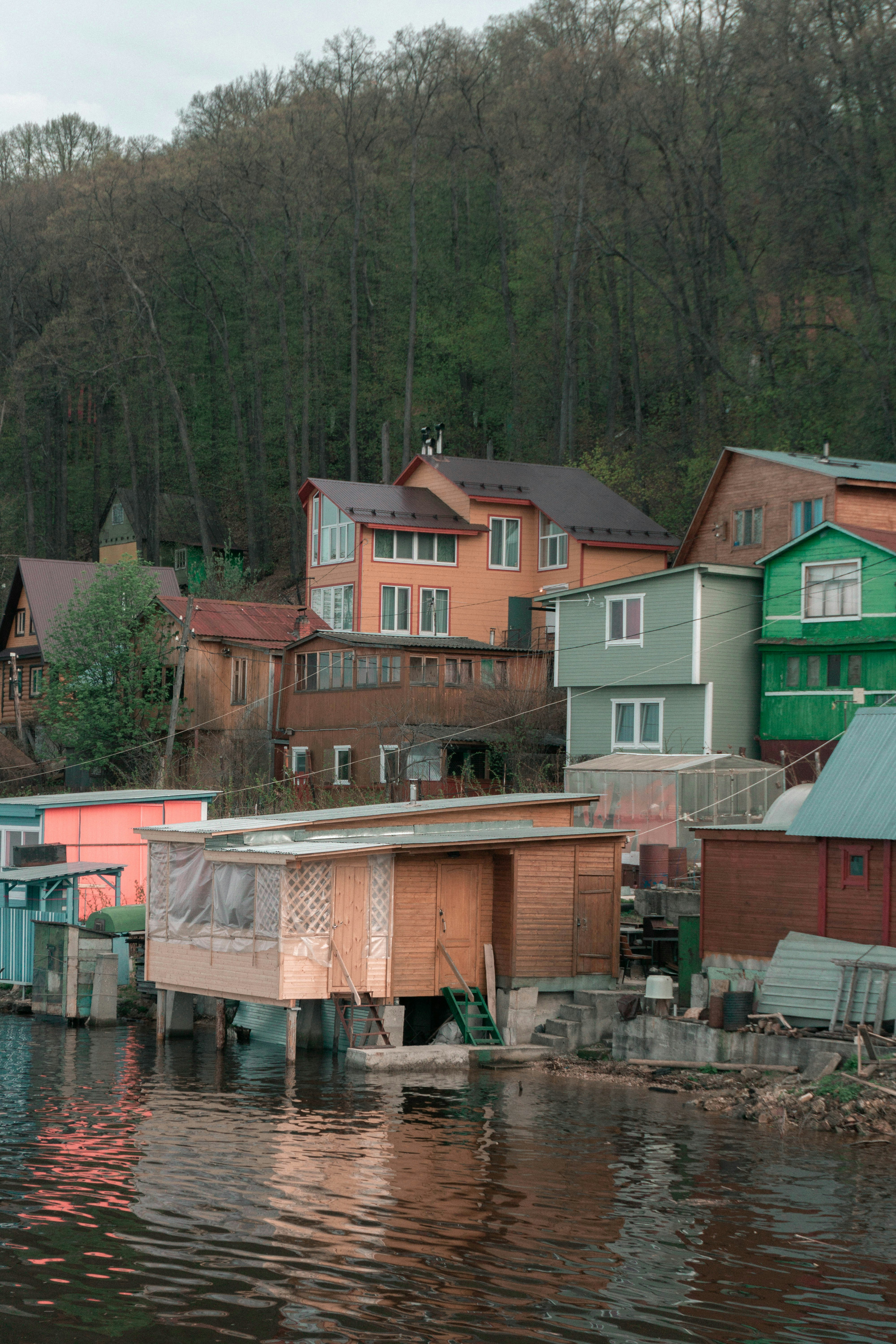 Hillside Village of Colorful Cottages by the Quiet Waterline