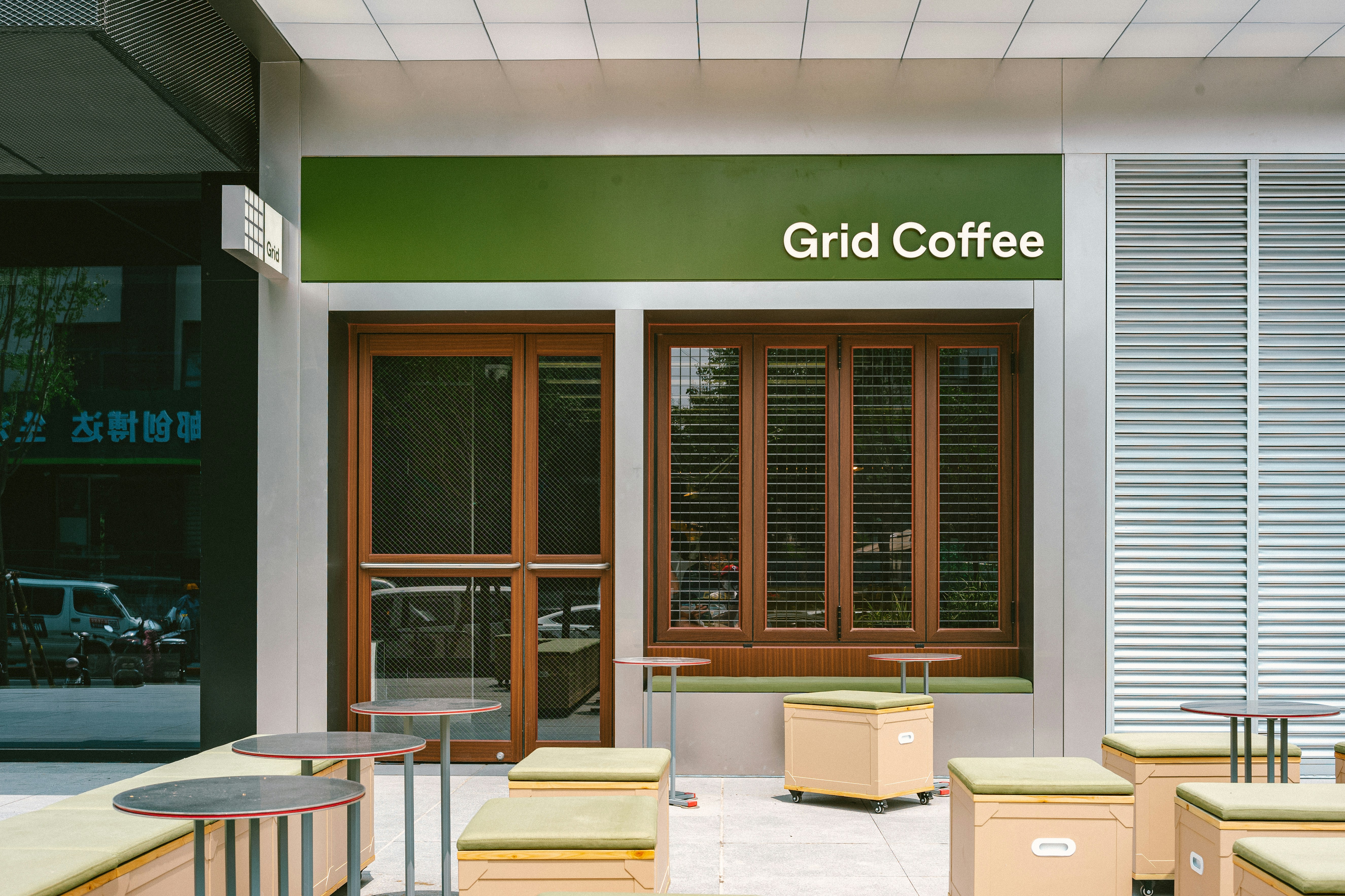 A coffee shop with green walls and [UNK] [UNK]s photo – Free Indoors ...
